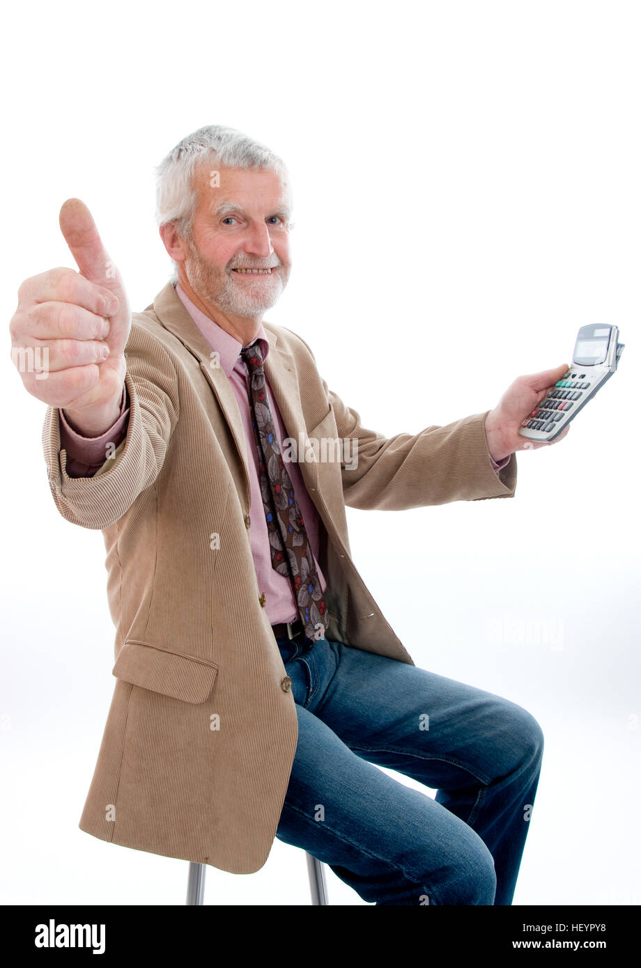 Older businessman holding calculator, thumbs-up: symbol for a ...
