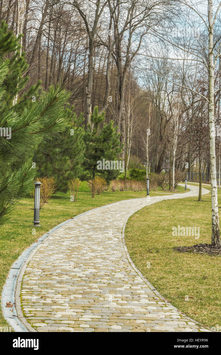 Beautiful path in the spring park Stock Photo - Alamy