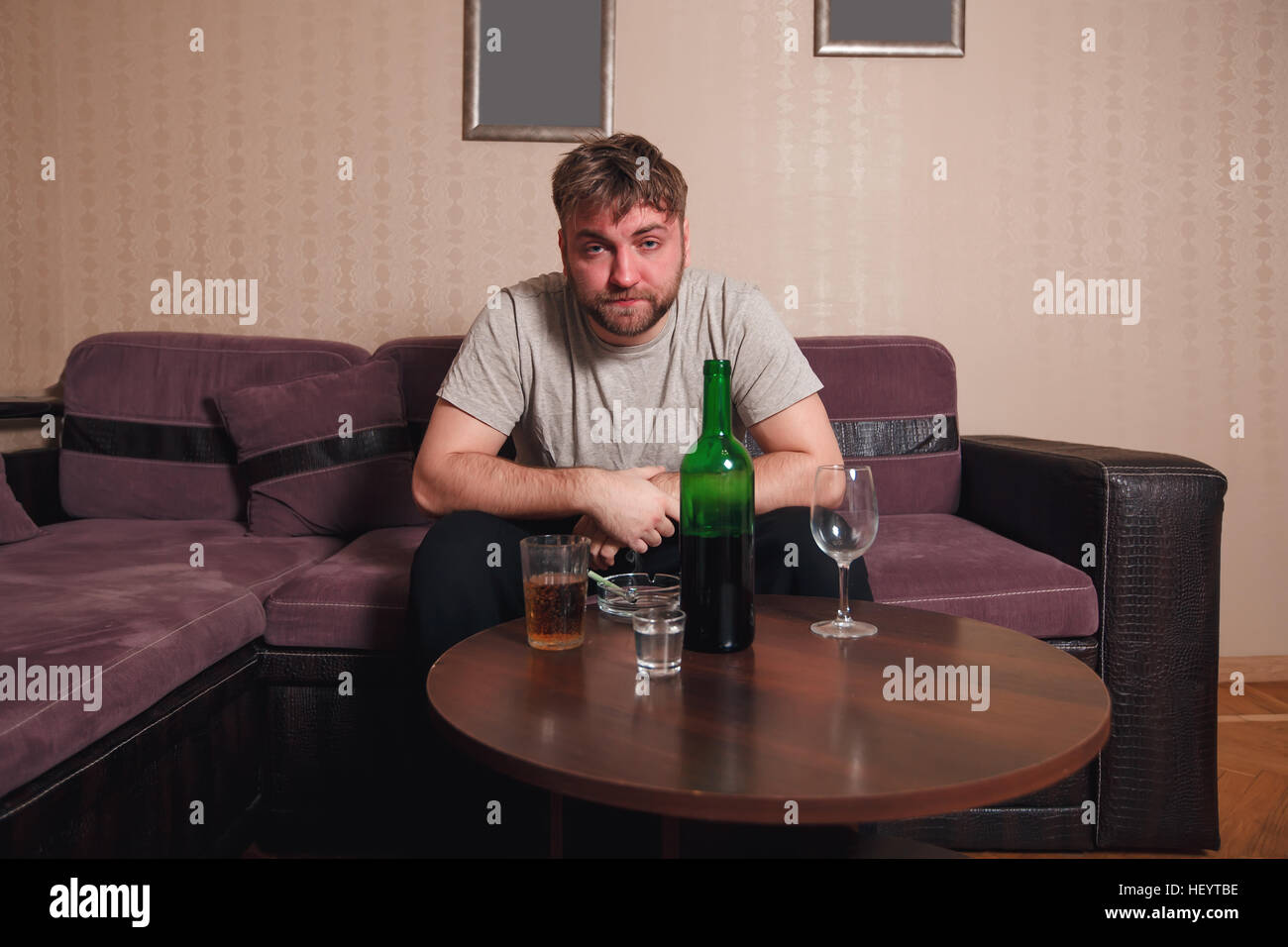 Anonymous alcoholic person drinking Stock Photo - Alamy