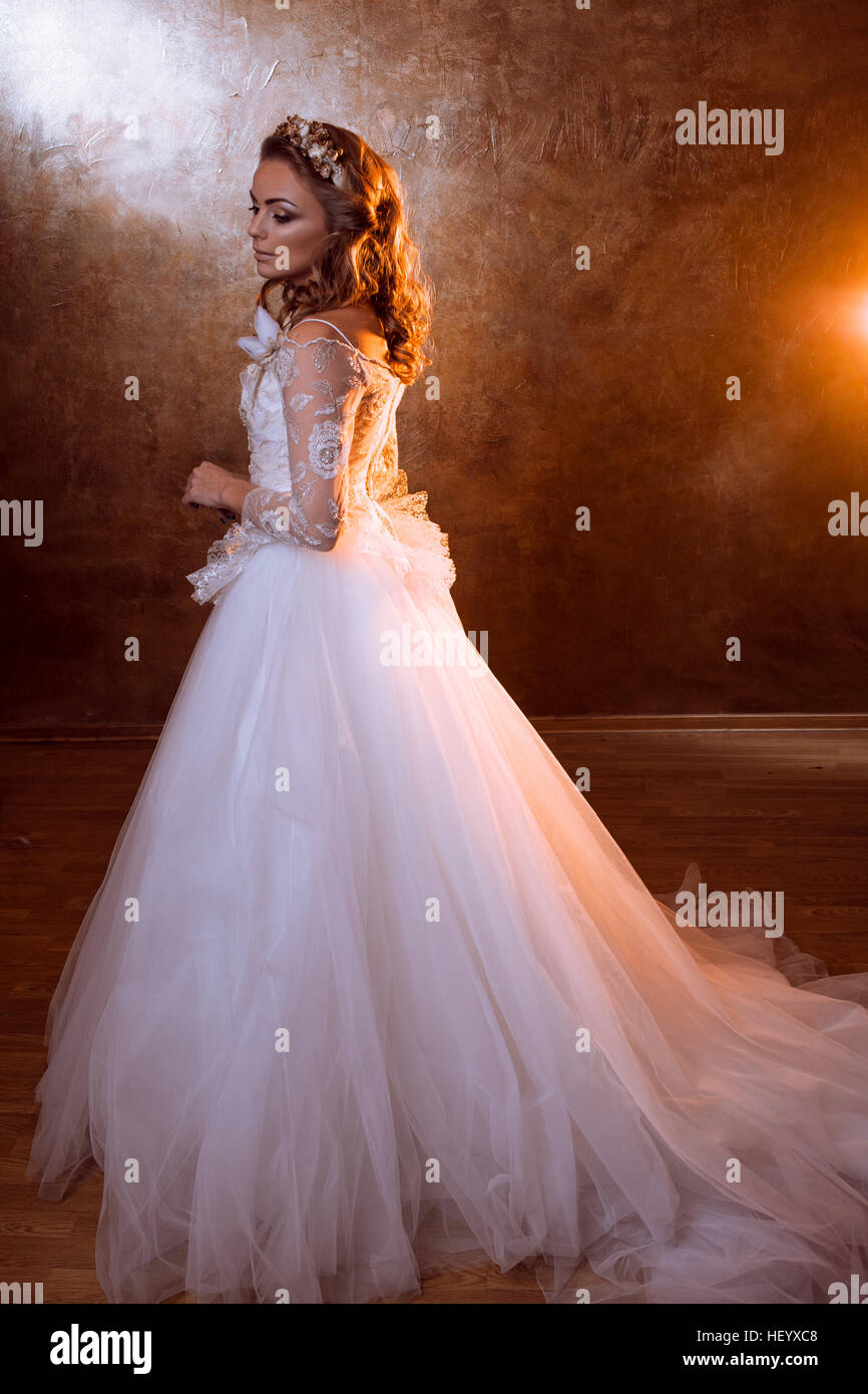 Beautiful girl bride in luxurious wedding dress, portrait in Golden ...