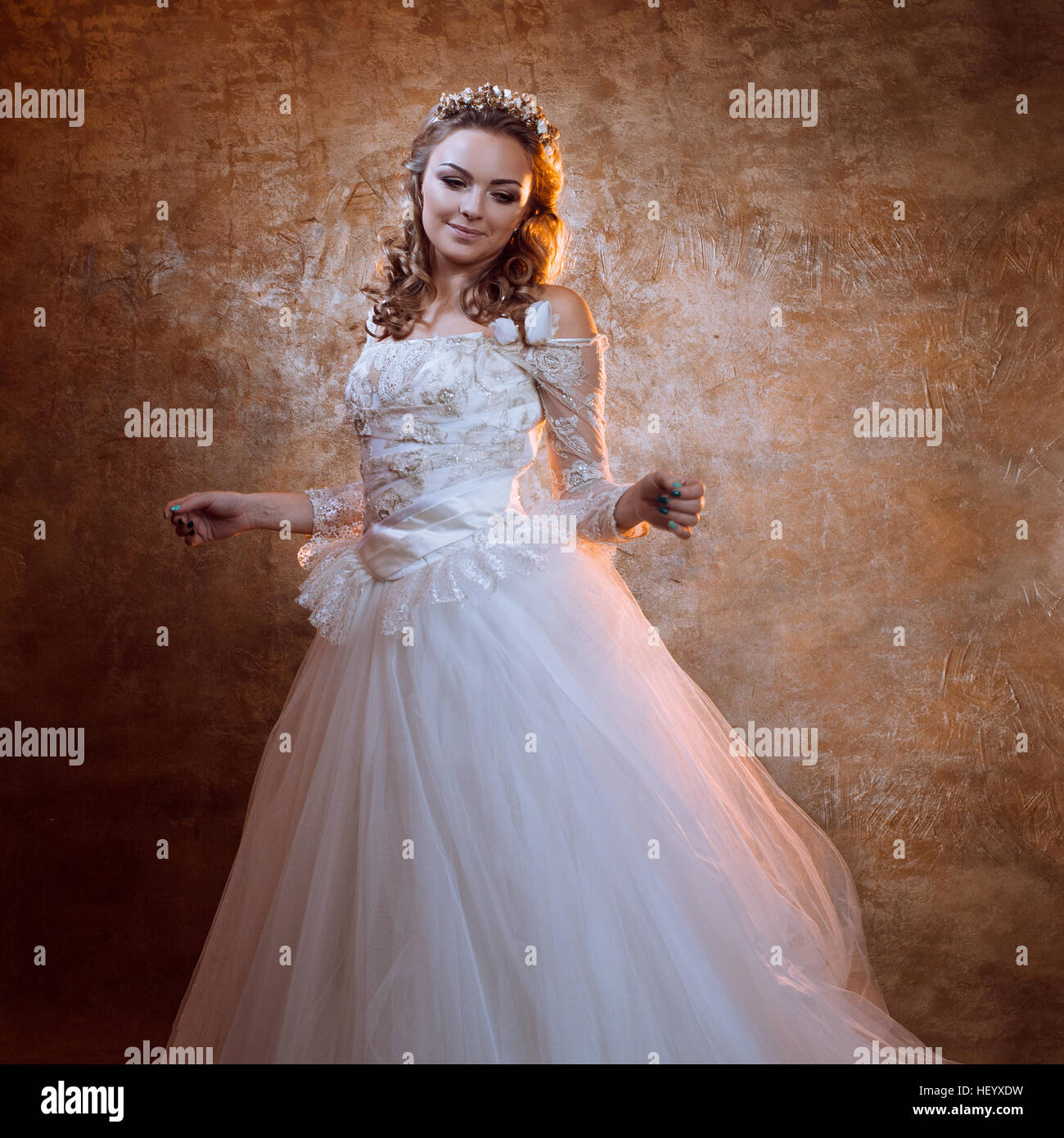 Beautiful girl bride in luxurious wedding dress, portrait in Golden ...