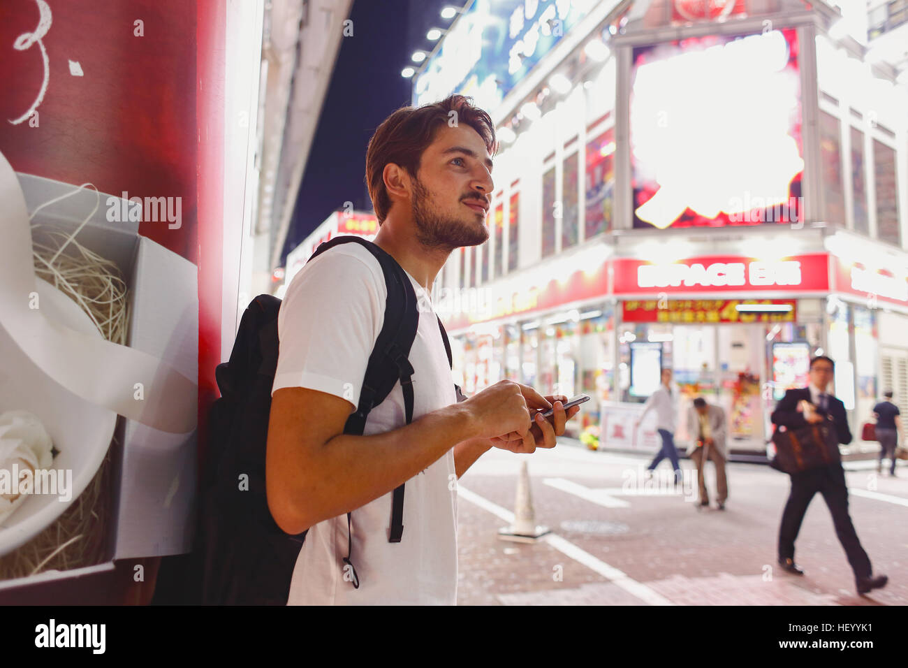 Caucasian man enjoying sightseeing in tokyo hi-res stock photography ...