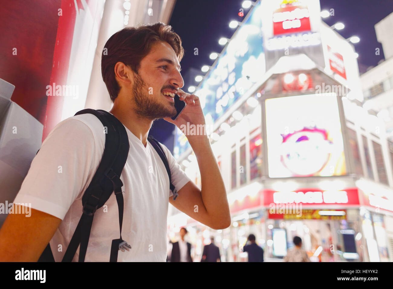 Caucasian man enjoying sightseeing in Tokyo, Japan Stock Photo - Alamy