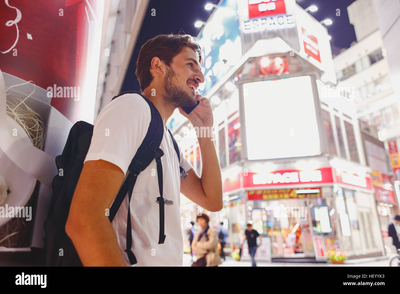 Caucasian man enjoying sightseeing in tokyo hi-res stock photography ...