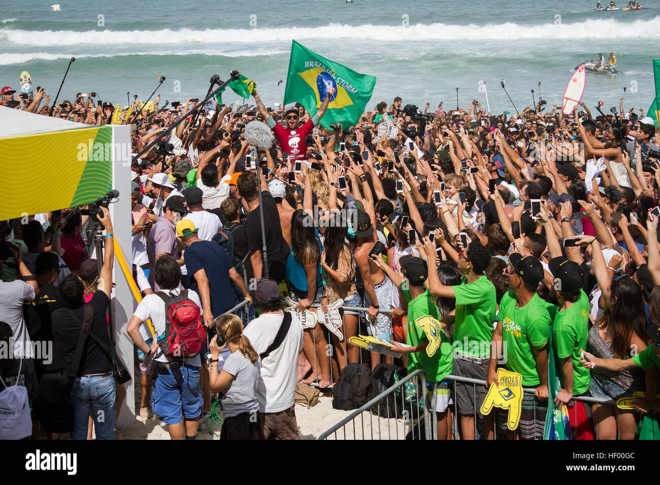 Crowd of fans hailing the winner of a surf competition Stock Photo - Alamy