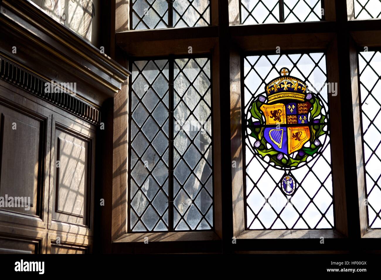 stained glass window light shadows wooden frame Stock Photo - Alamy