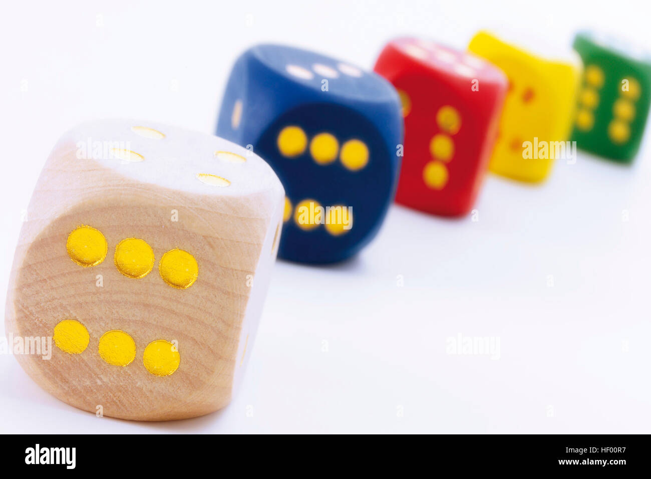 Colourful wooden dice Stock Photo - Alamy