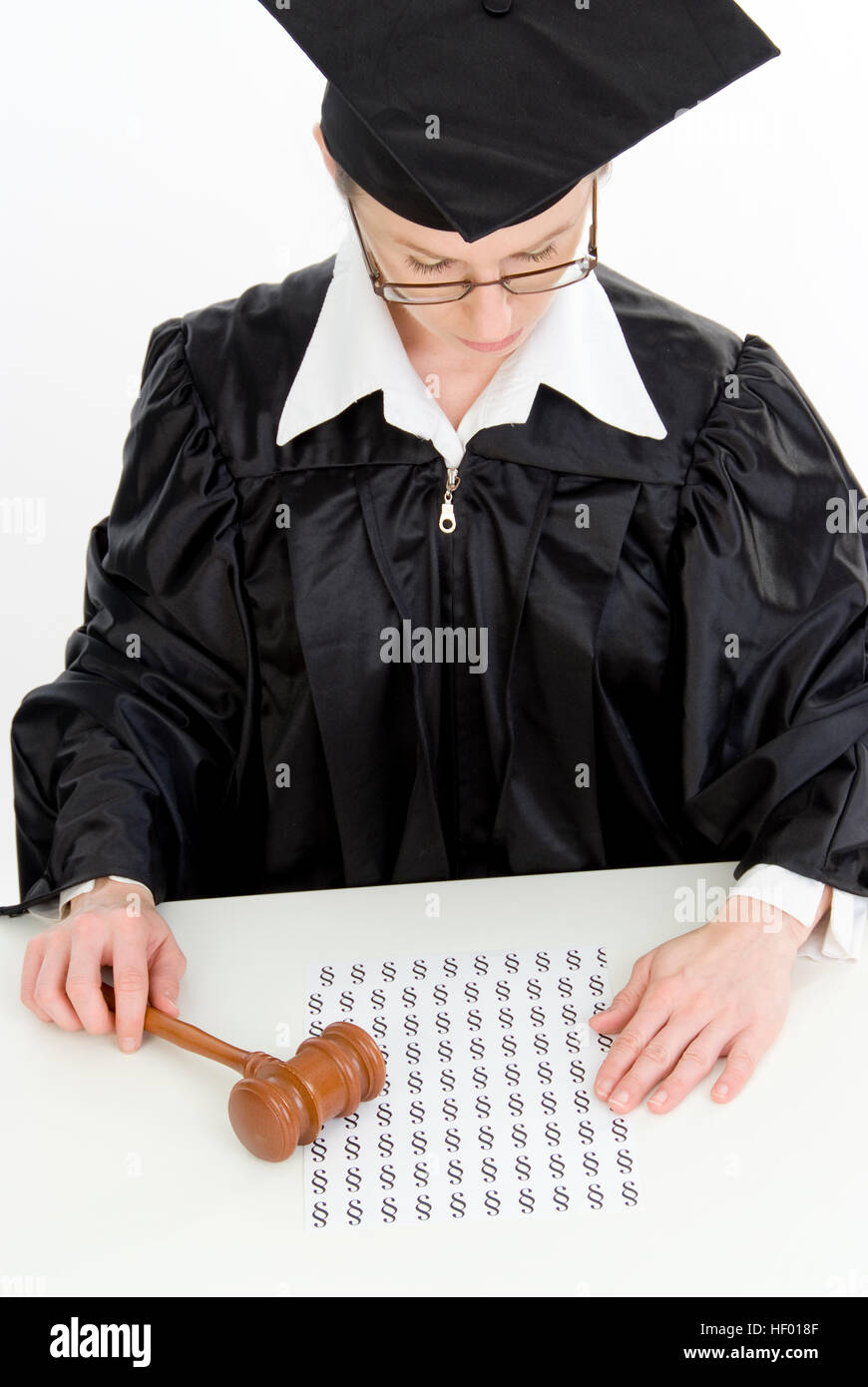 Female judge reading paragraphs (legal articles Stock Photo - Alamy