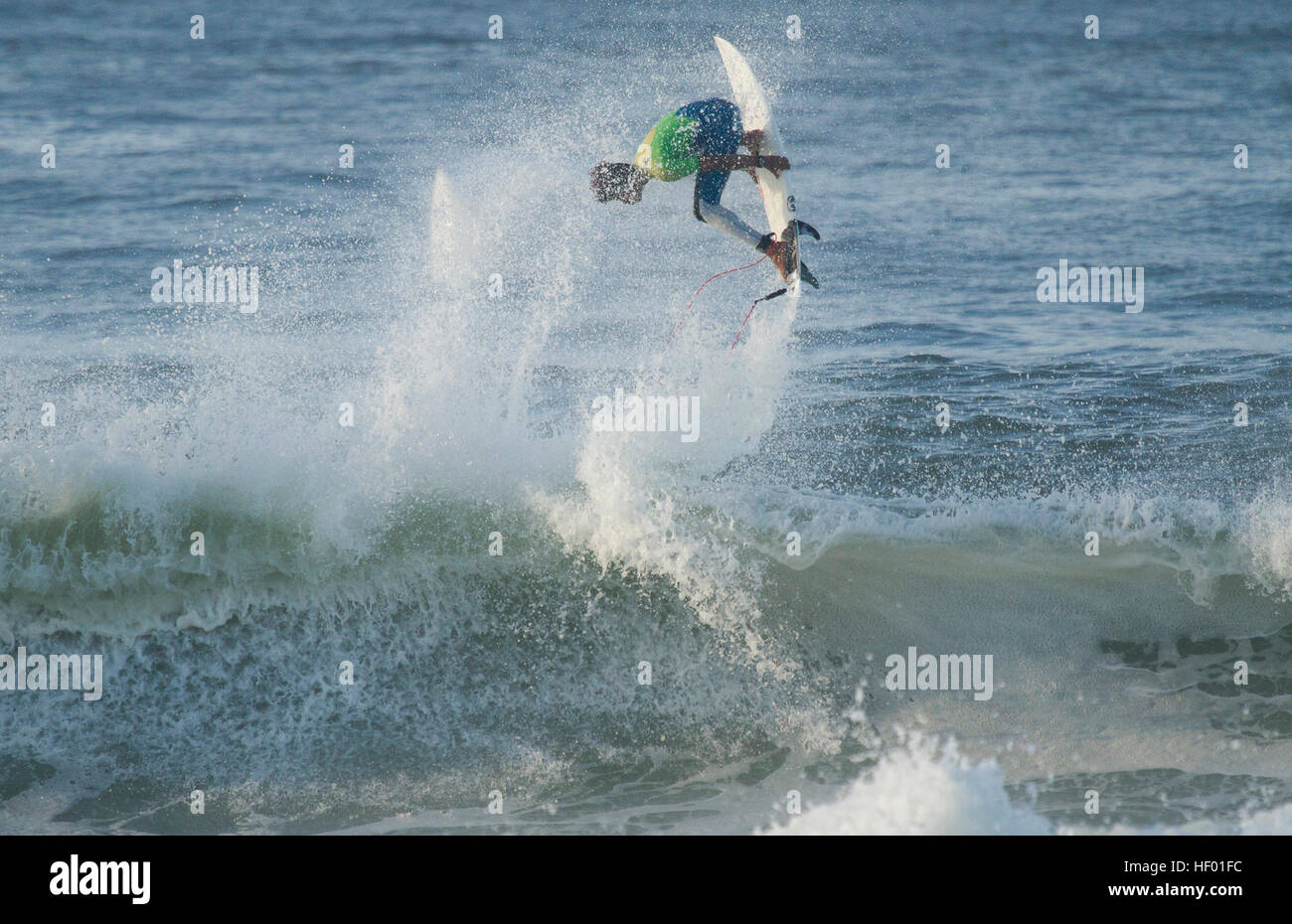 Surfer attempting a Kerrup flip Stock Photo - Alamy