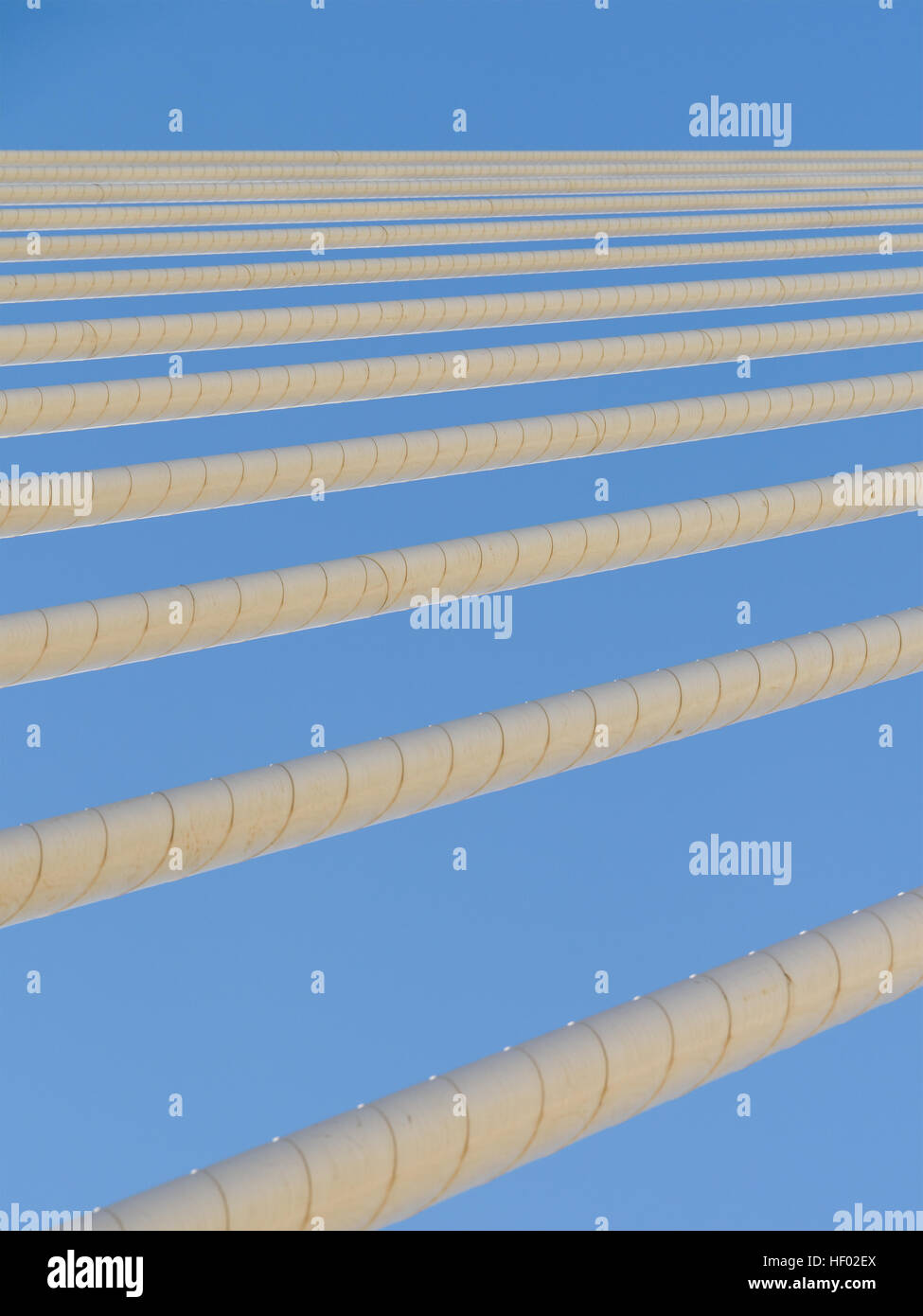 Steel Bridge Cables On Blue Sky Stock Photo - Alamy