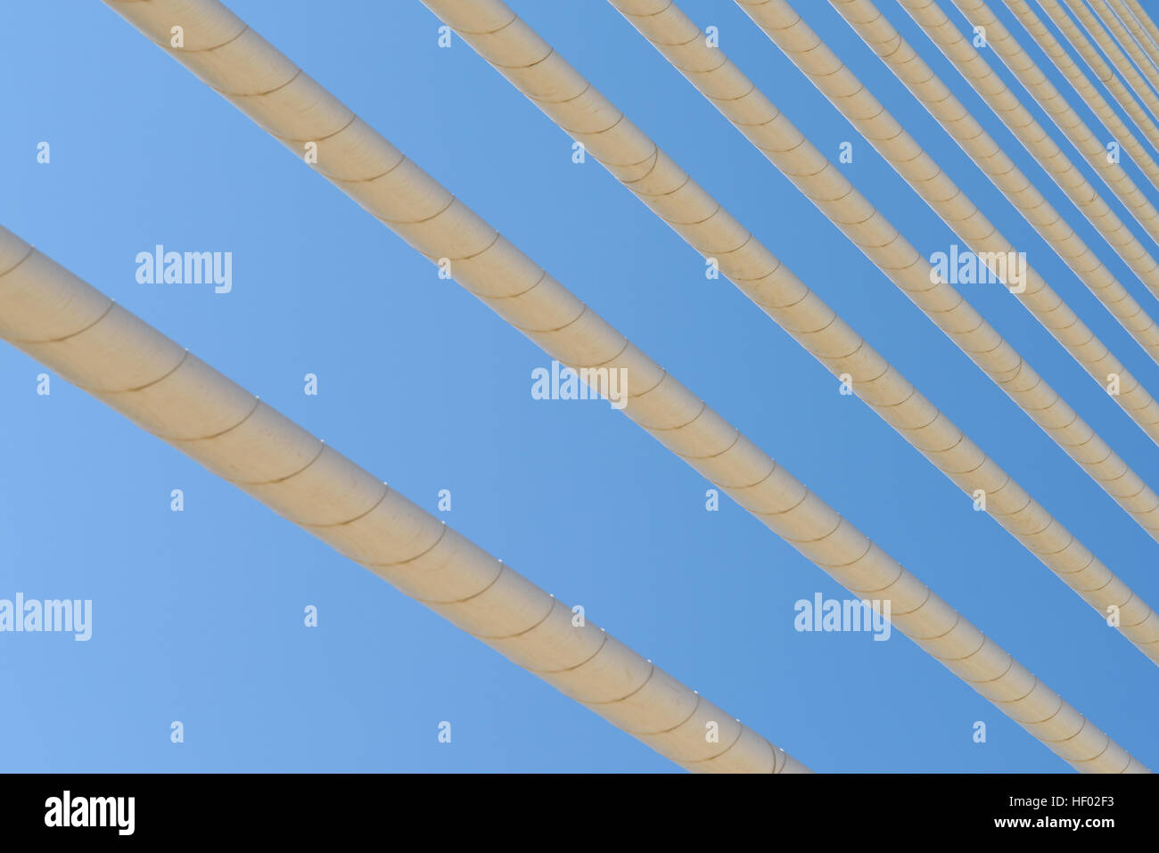 Steel Bridge Cables On Blue Sky Stock Photo - Alamy