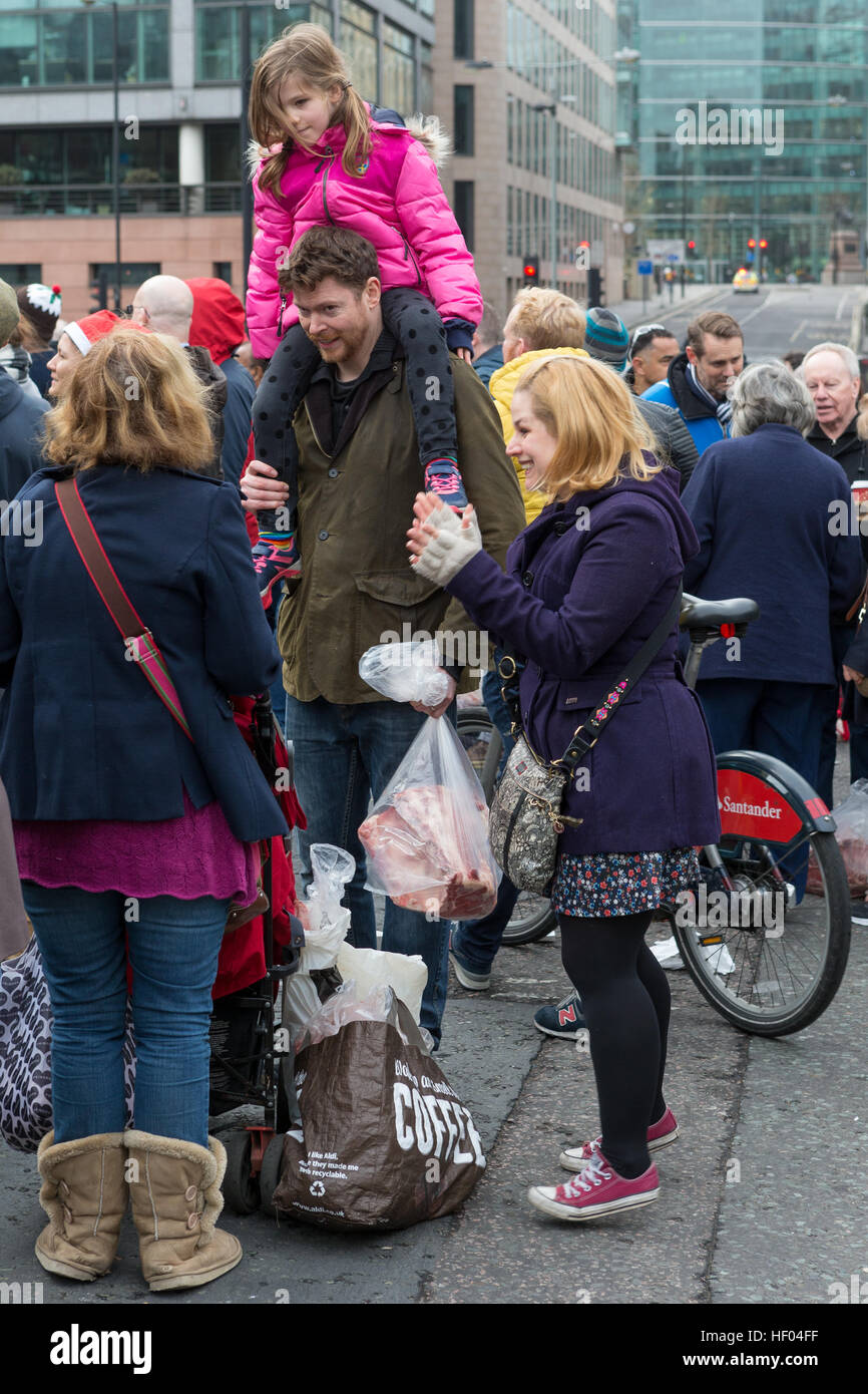 London, UK. 24th December, 2016. Traditional Christmas Eve meat auction ...