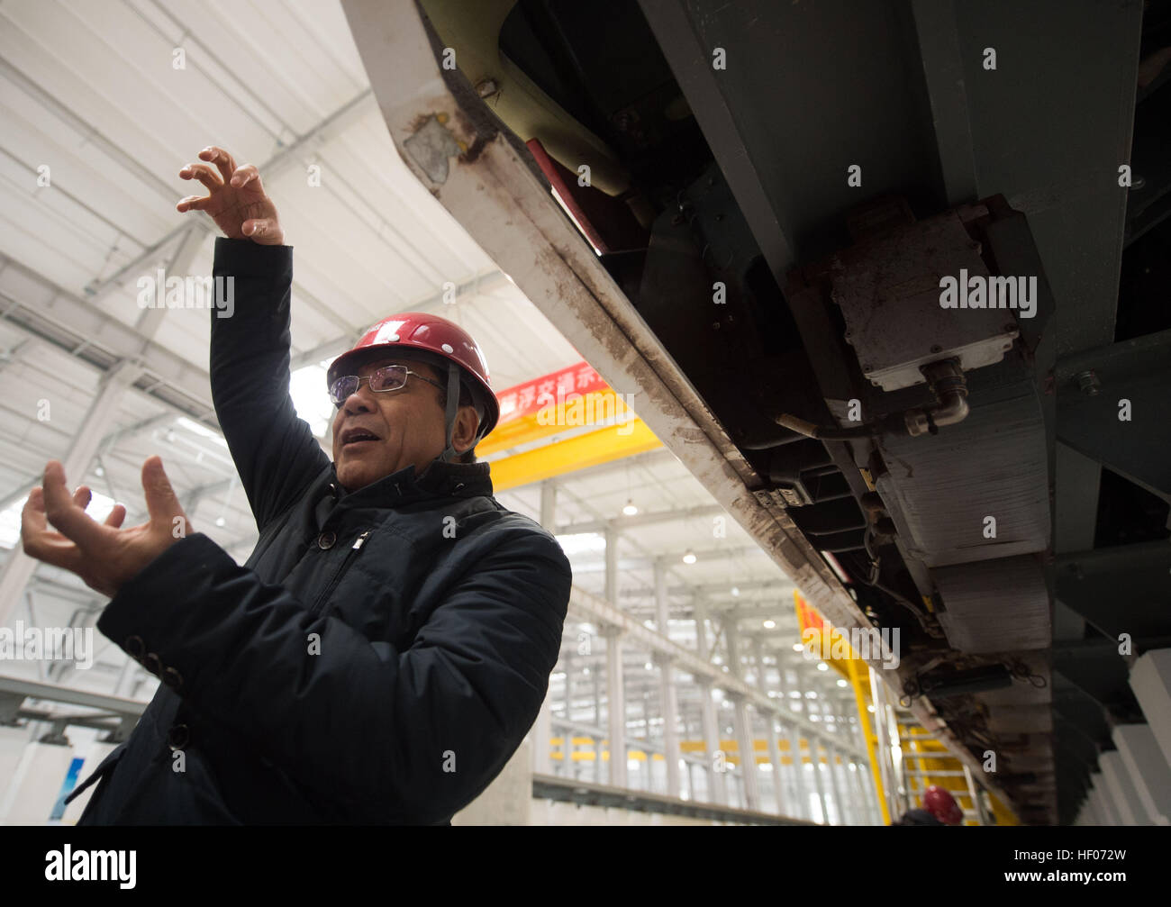 Beijing, China. 25th Dec, 2016. A technician introduces Beijing's first ...