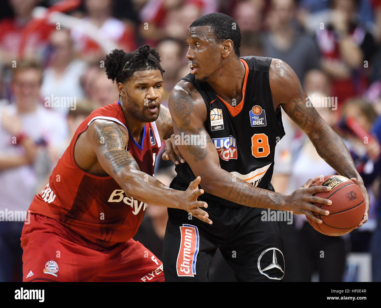 Munich, Germany. 26th Dec, 2016. Raymar Morgan (R) from Ulm and Devin ...
