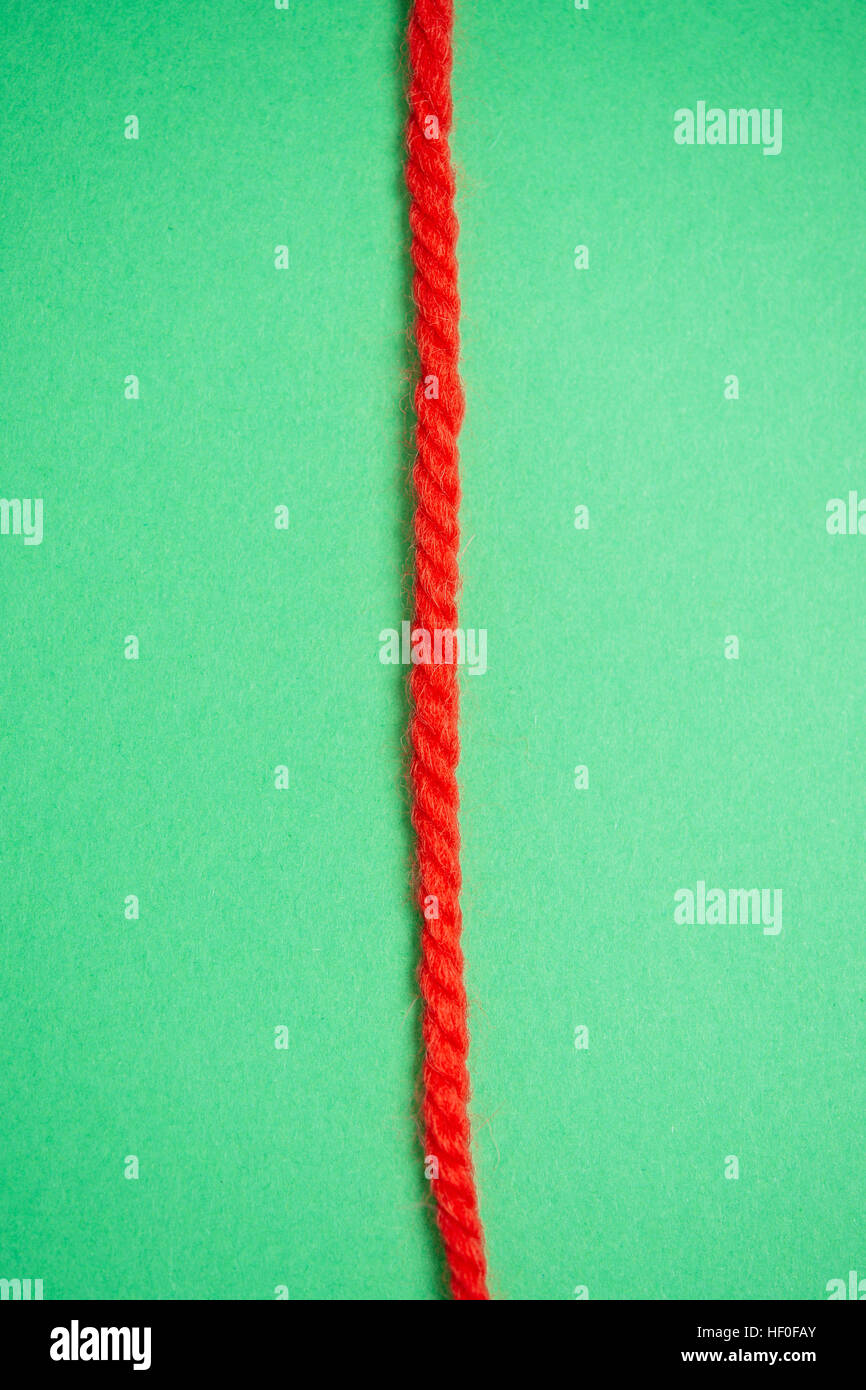 Oberursel, Germany. 25th Nov, 2016. Symbolic picture of a red thread ...