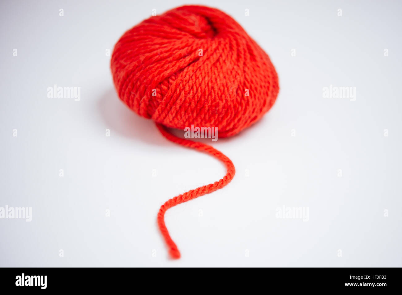 Oberursel, Germany. 25th Nov, 2016. Symbolic picture of a red thread ...