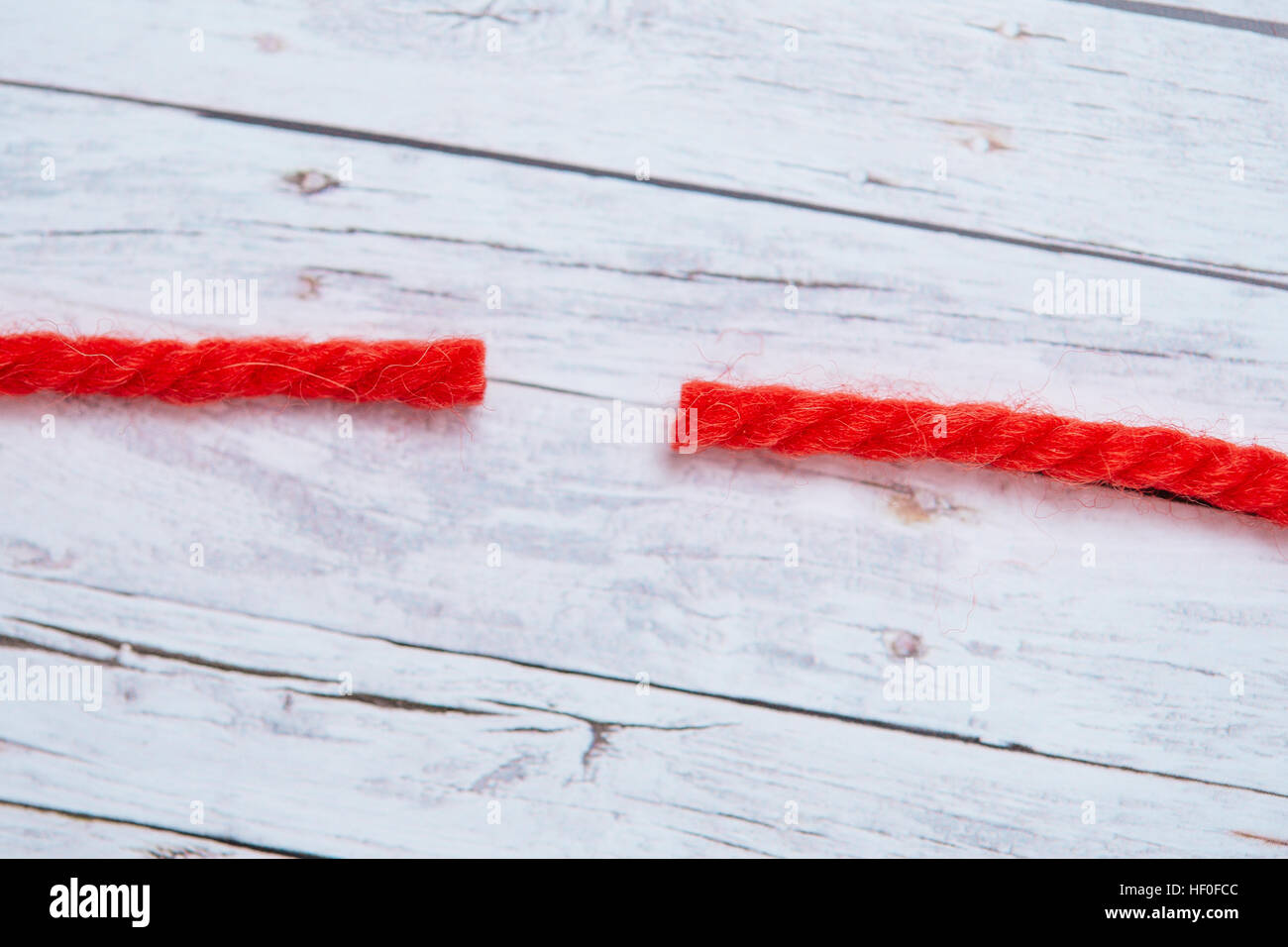 Oberursel, Germany. 25th Nov, 2016. Symbolic picture of a red thread ...