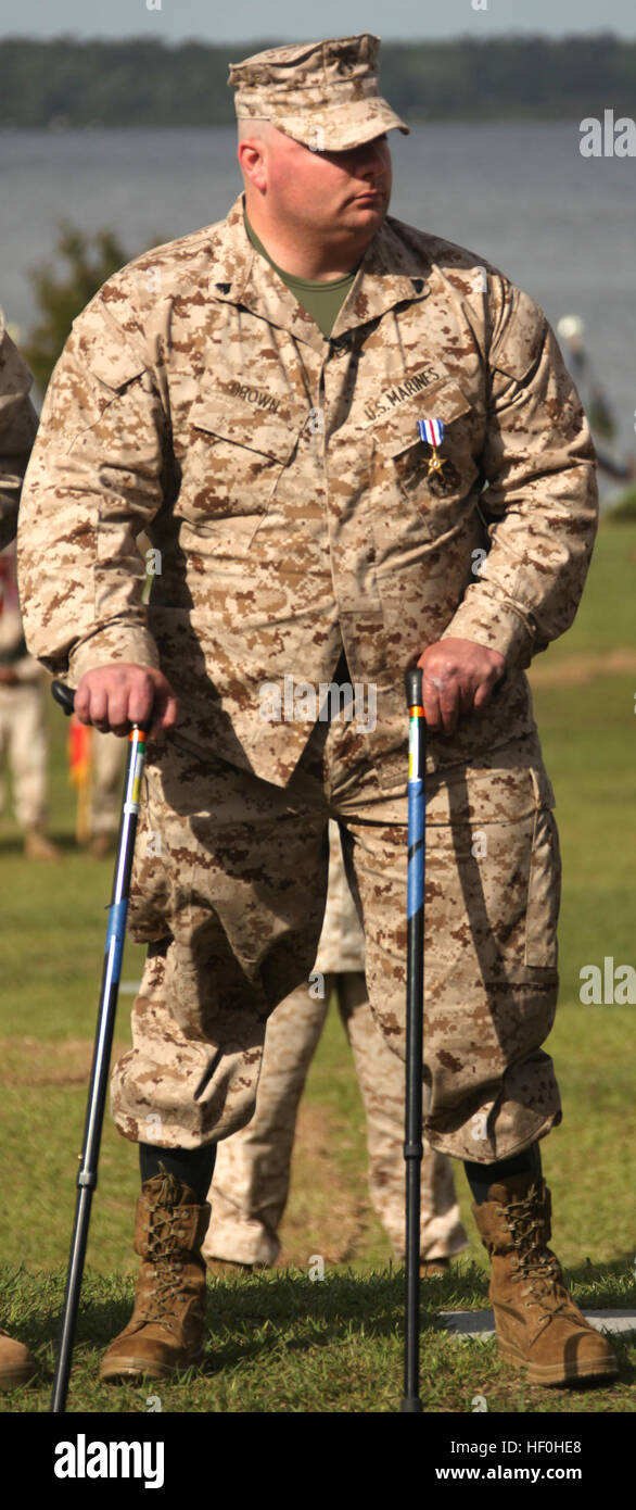 Cpl. Christian A. Brown listens as Brig. Gen. James Lukeman, commanding ...