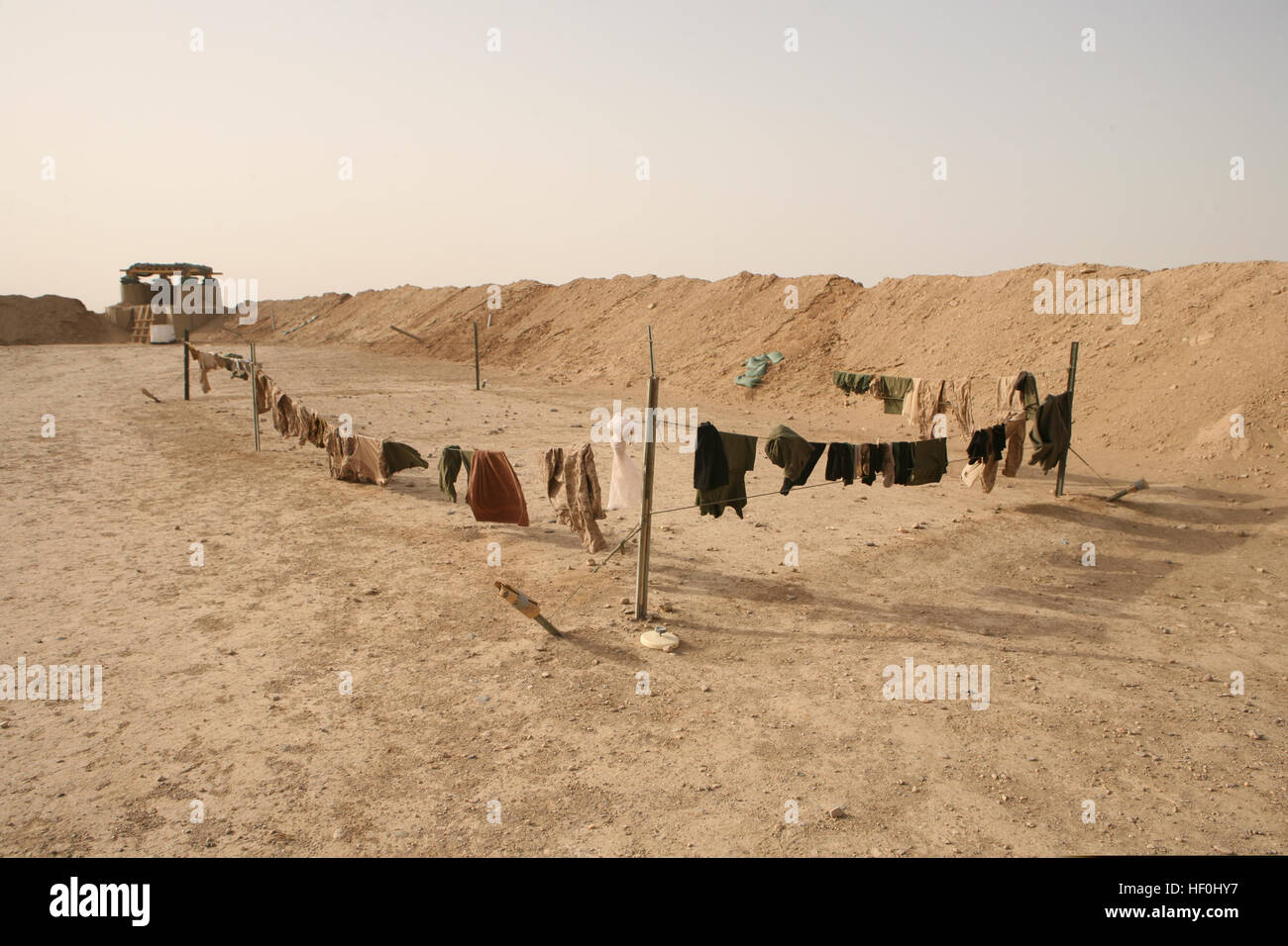 U. S. Marines from Alpha Battery hang dry their laundry on homemade ...