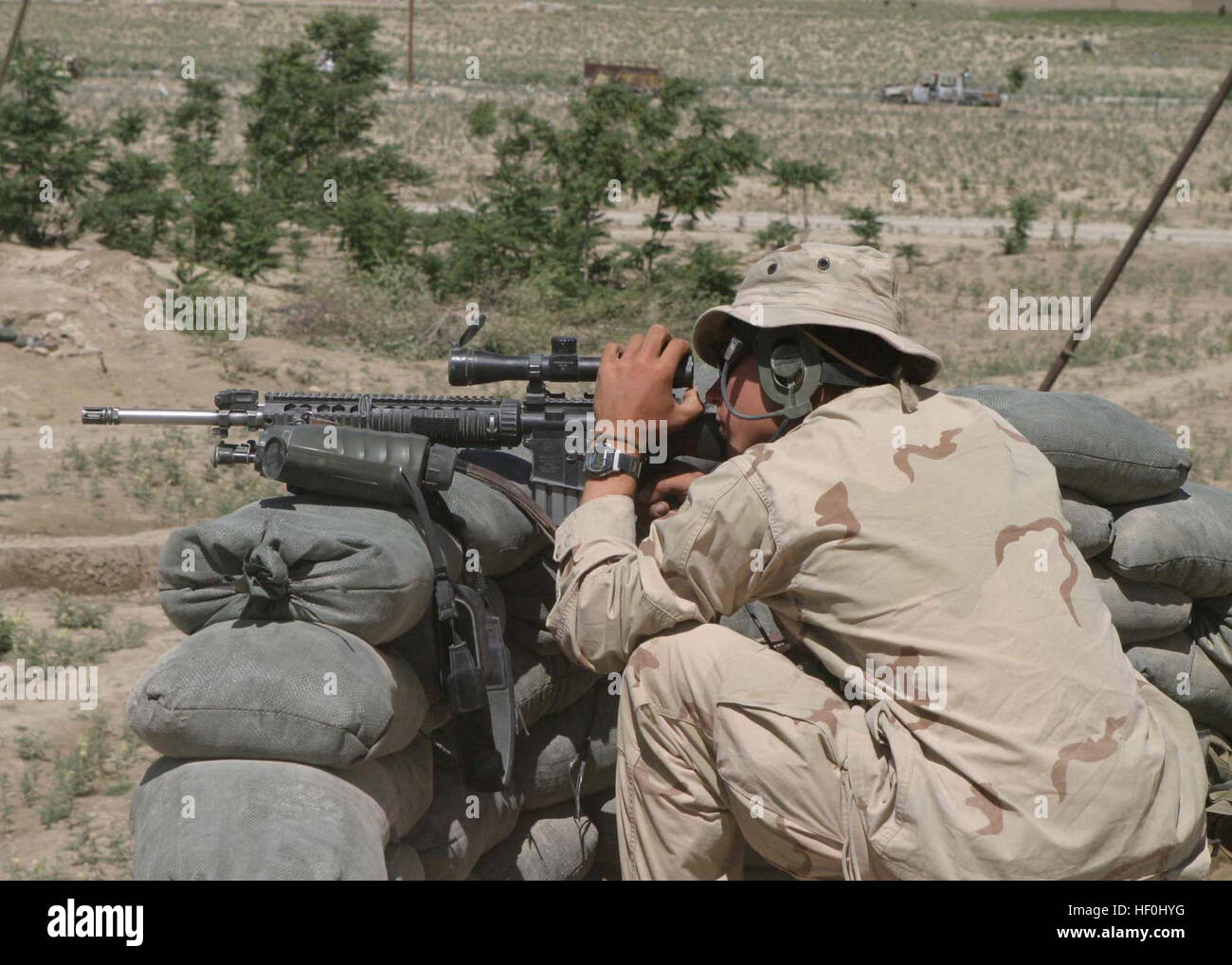 A designated marksman from Alpha Co., Battalion Landing Team 1st Bn ...