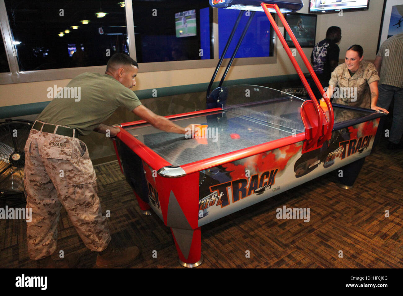 Corporal Mark Rosario, left, and Pfc. Brooklyn Waser, right, with ...