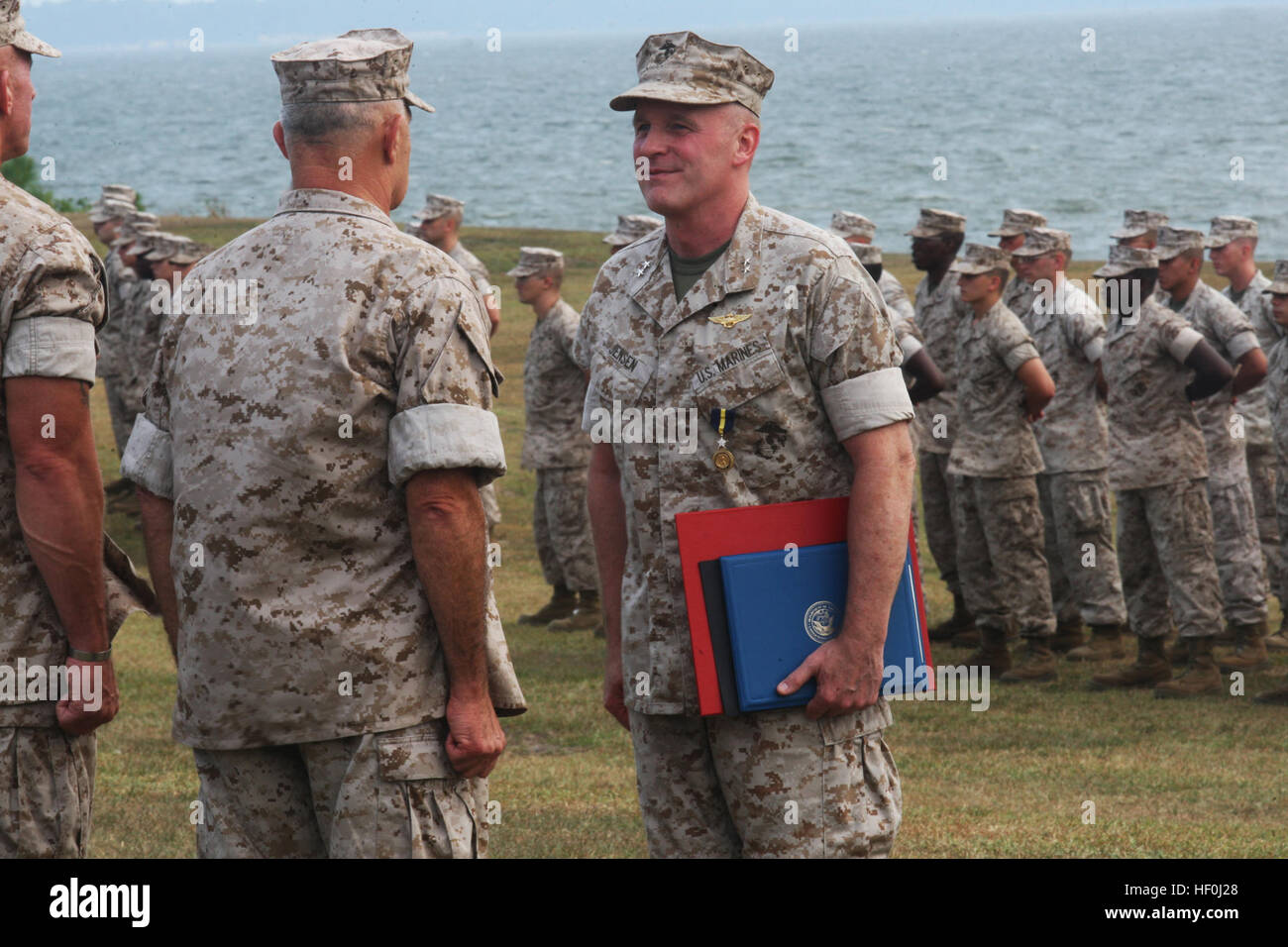 Maj. Gen. Carl B. Jensen (right), outgoing commanding general of Marine ...