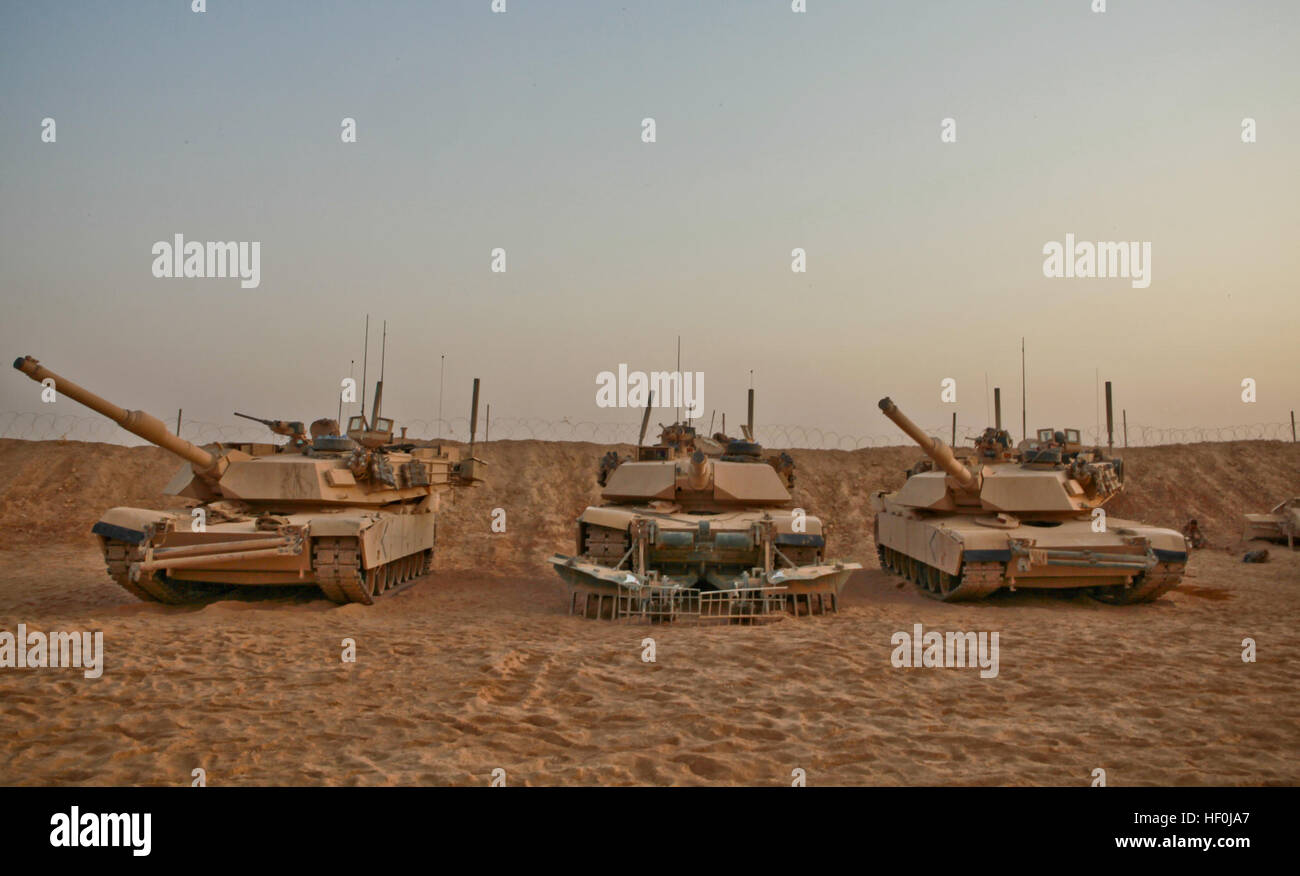 COMBAT OUTPOST SHIR GHAZAY, Helmand province, Afghanistan -- Tanks with ...