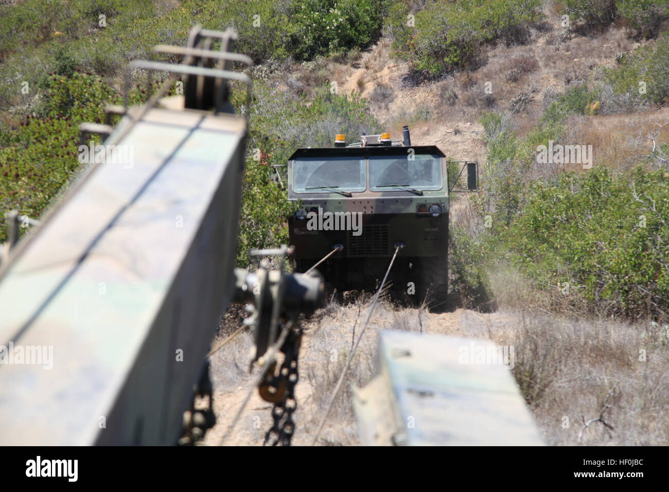 U.S. Navy sailors with Amphibious Construction Battalion One operated ...