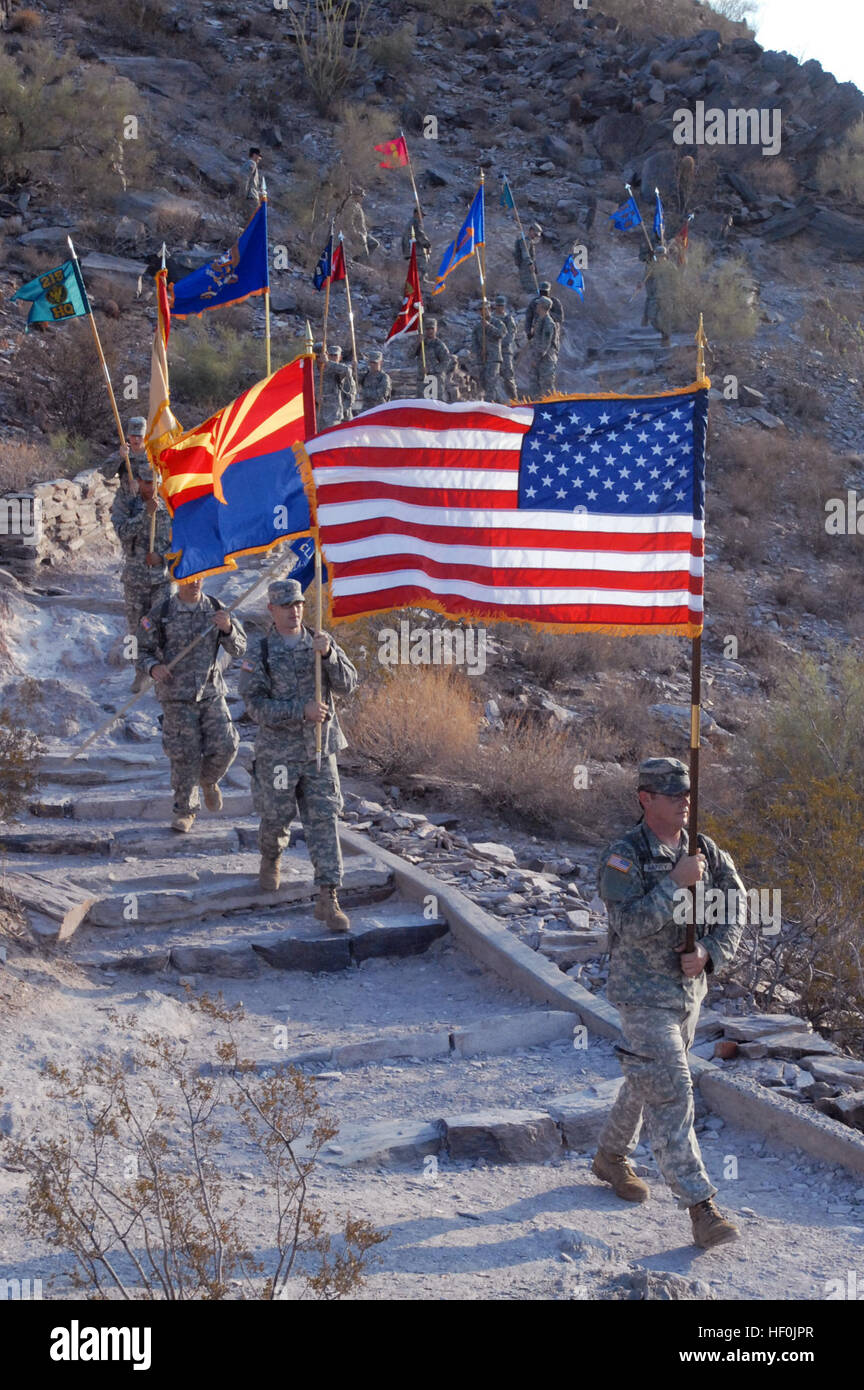 The national and state colors lead unit guidons fluttering in the wind ...