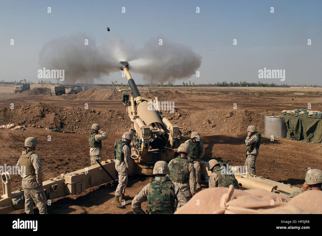 The US Marine Corps (USMC) M-198 155mm Howitzer gun crew of 4th ...