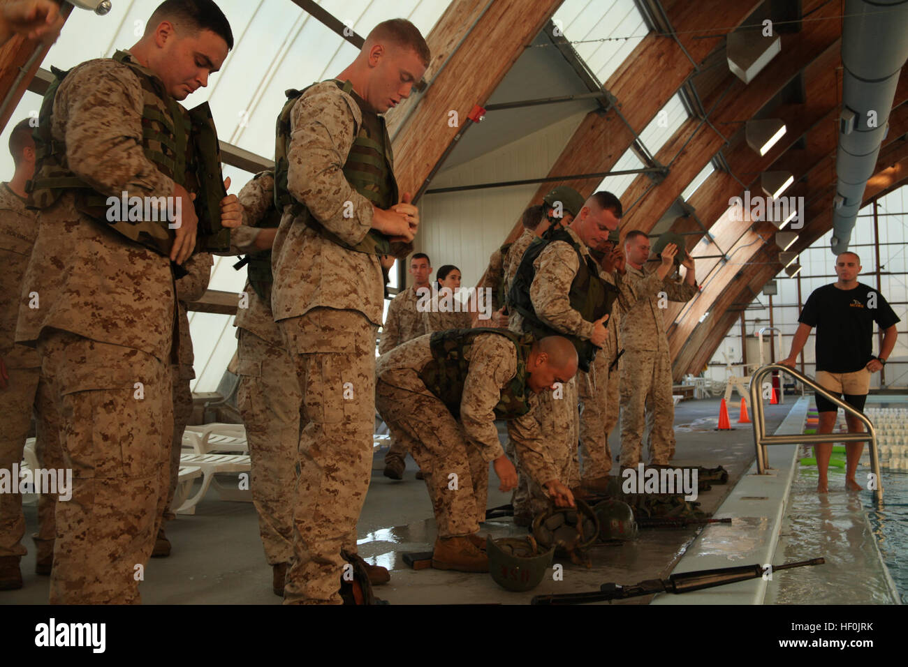 Marines put on gear to take off in the Cherry Point combat pool as a ...