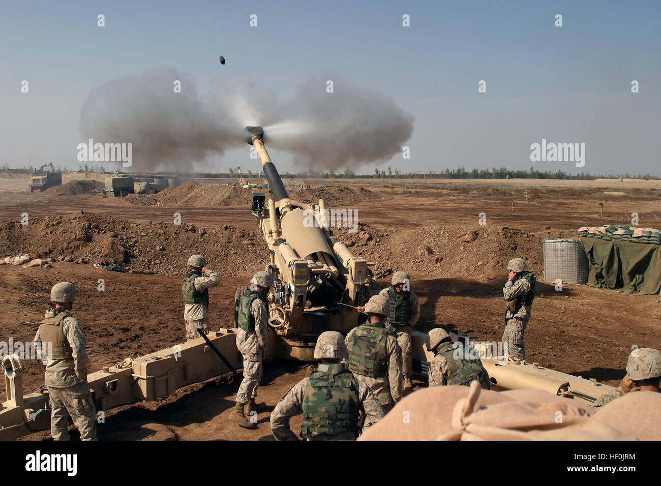 The US Marine Corps (USMC) M-198 155mm Howitzer gun crew of 4th ...