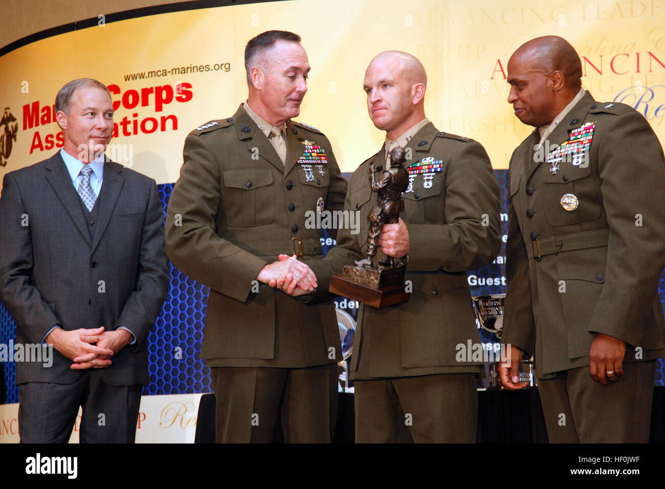 Capt. Tyson M. Ackerman receives the Lt. Col. Michael D. Kuszewski ...