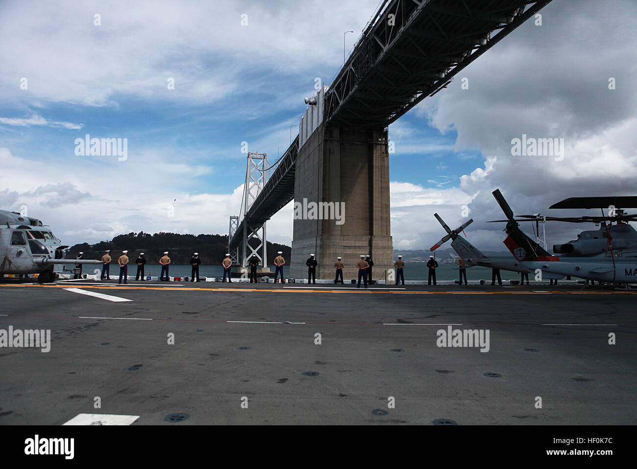 Static displays of Marine aircraft flank Marines and sailors with I ...