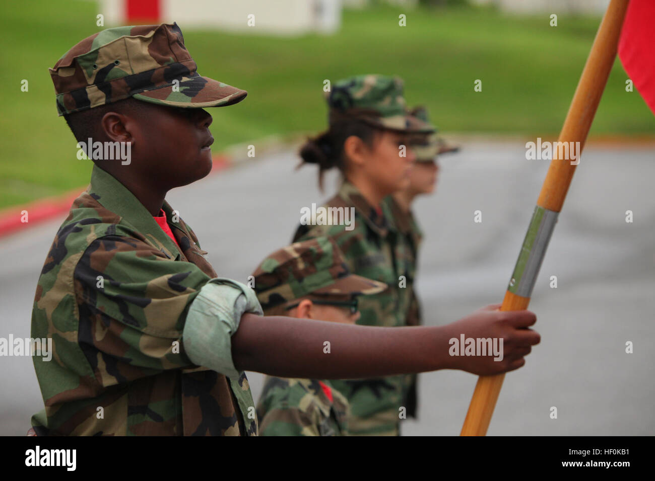 A Young Marine stands at parade rest during a promotion and awards ...