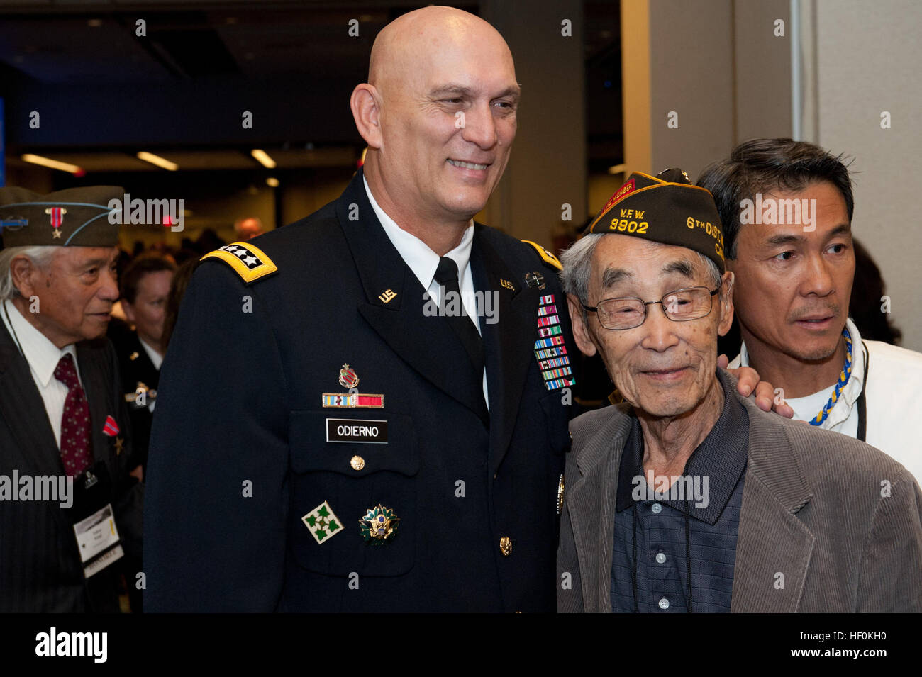U.S. Army Chief of Staff Gen. Raymond T. Odierno stands next to a Nisei ...