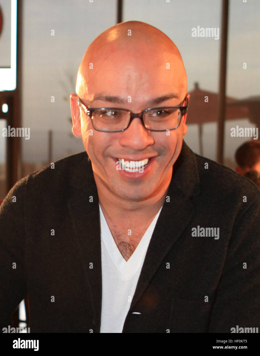 Standup comedian Jo Koy autographs his DVD for a Marine during a pre ...