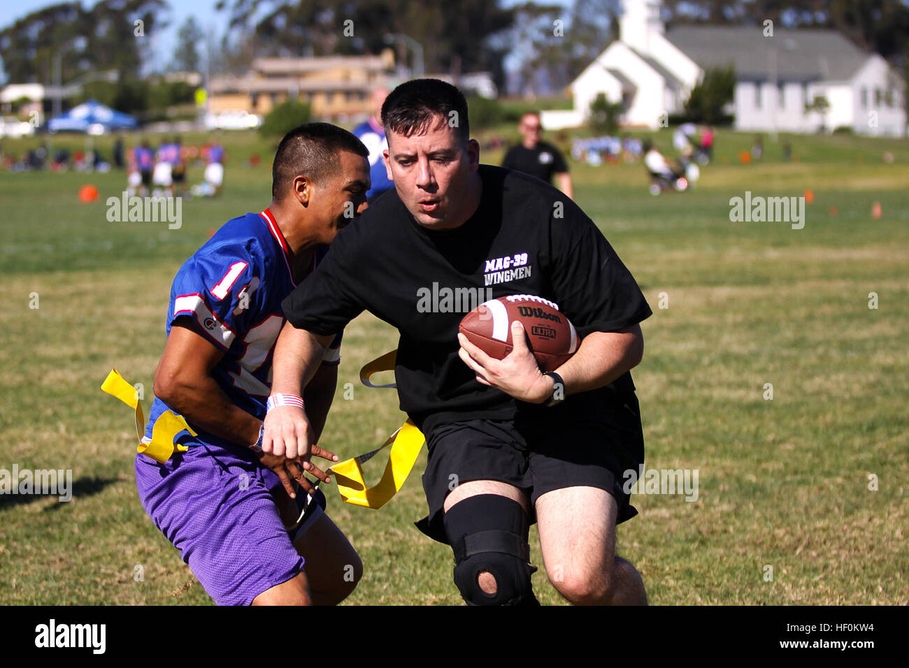 Particpants compete at Camp Pendleton’s 11 Area football field for the ...