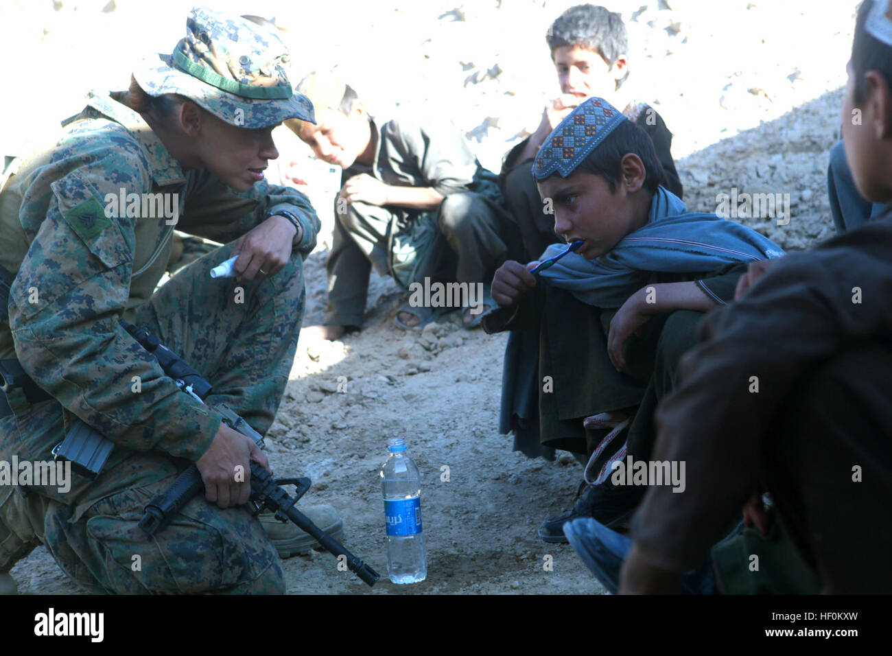 A group of children take part in a hygiene class at Patrol Base Florida ...