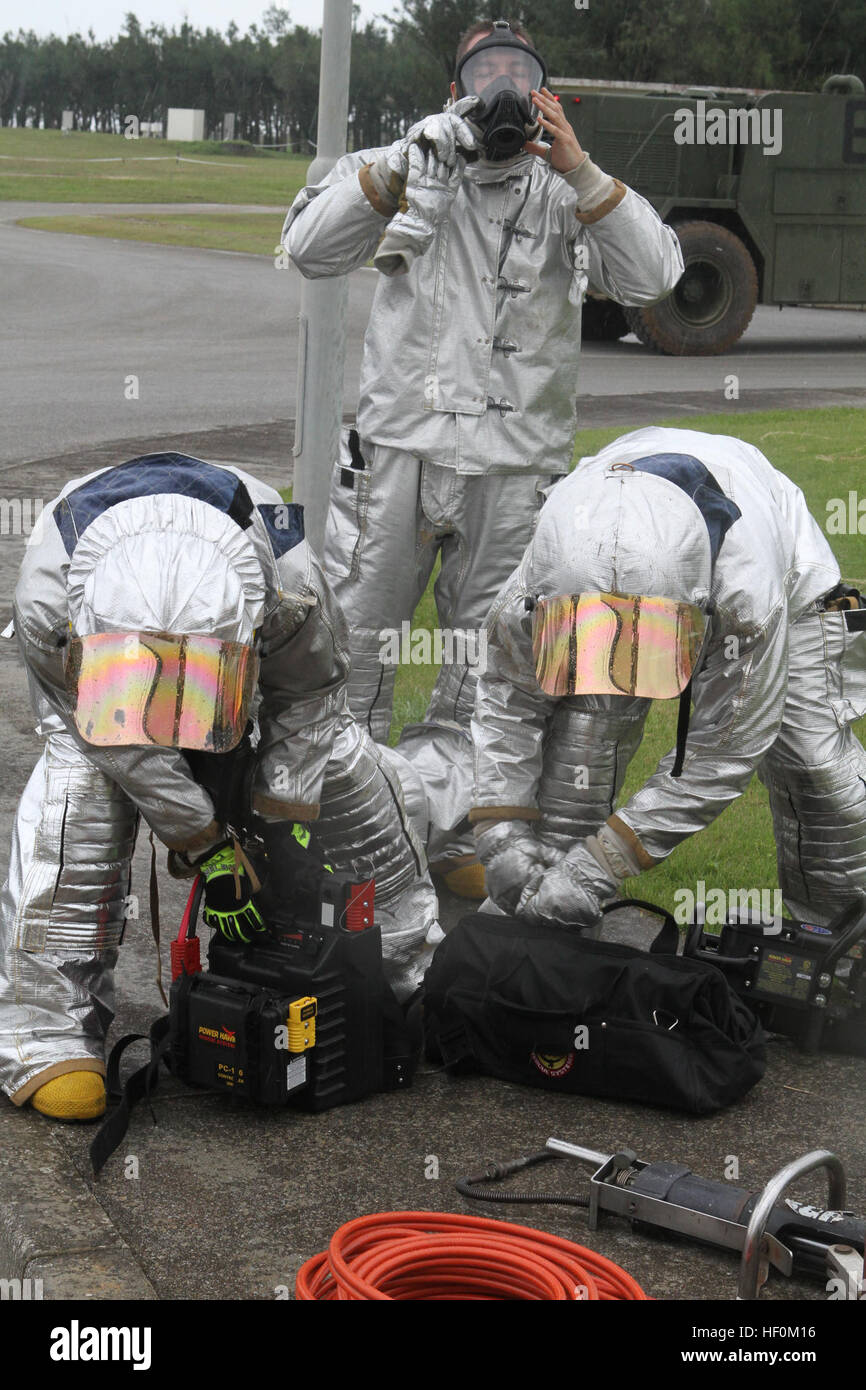 Aircraft rescue firefighter’s suit up in full proximity gear during ...
