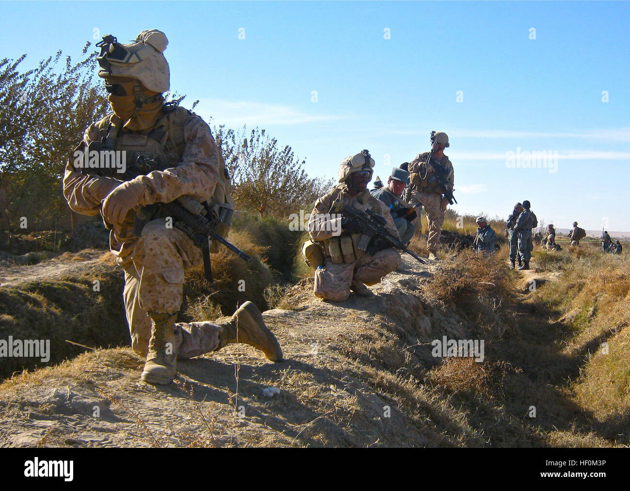 Marines and sailors of Border Advisory Team 2 patrol alongside Afghan ...