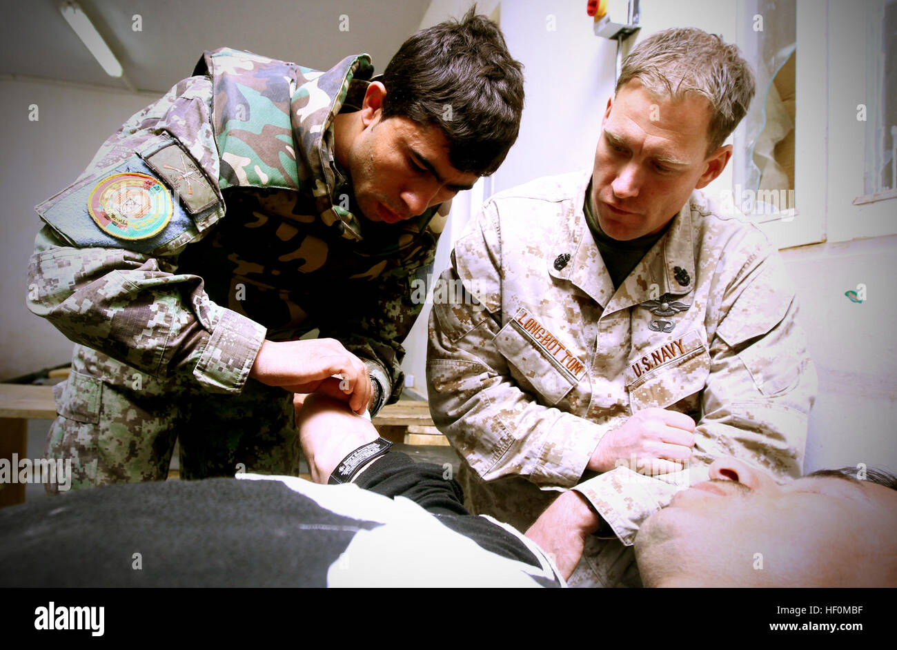 An Afghan National Army soldier with 1st Brigade, 215th Corps, prepares ...