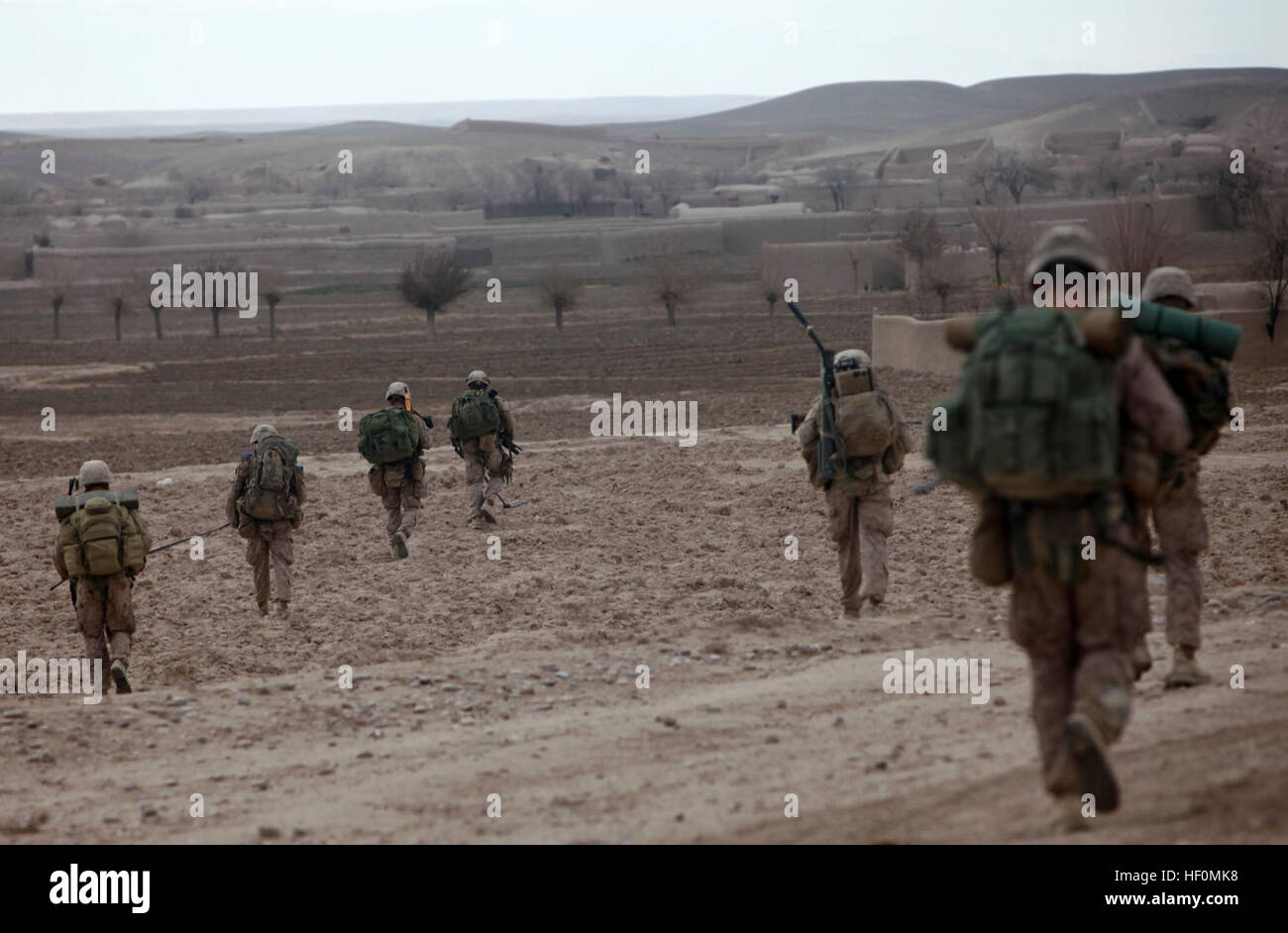 Marines with Fox Company, 2nd Battalion, 4th Marine Regiment, move from ...