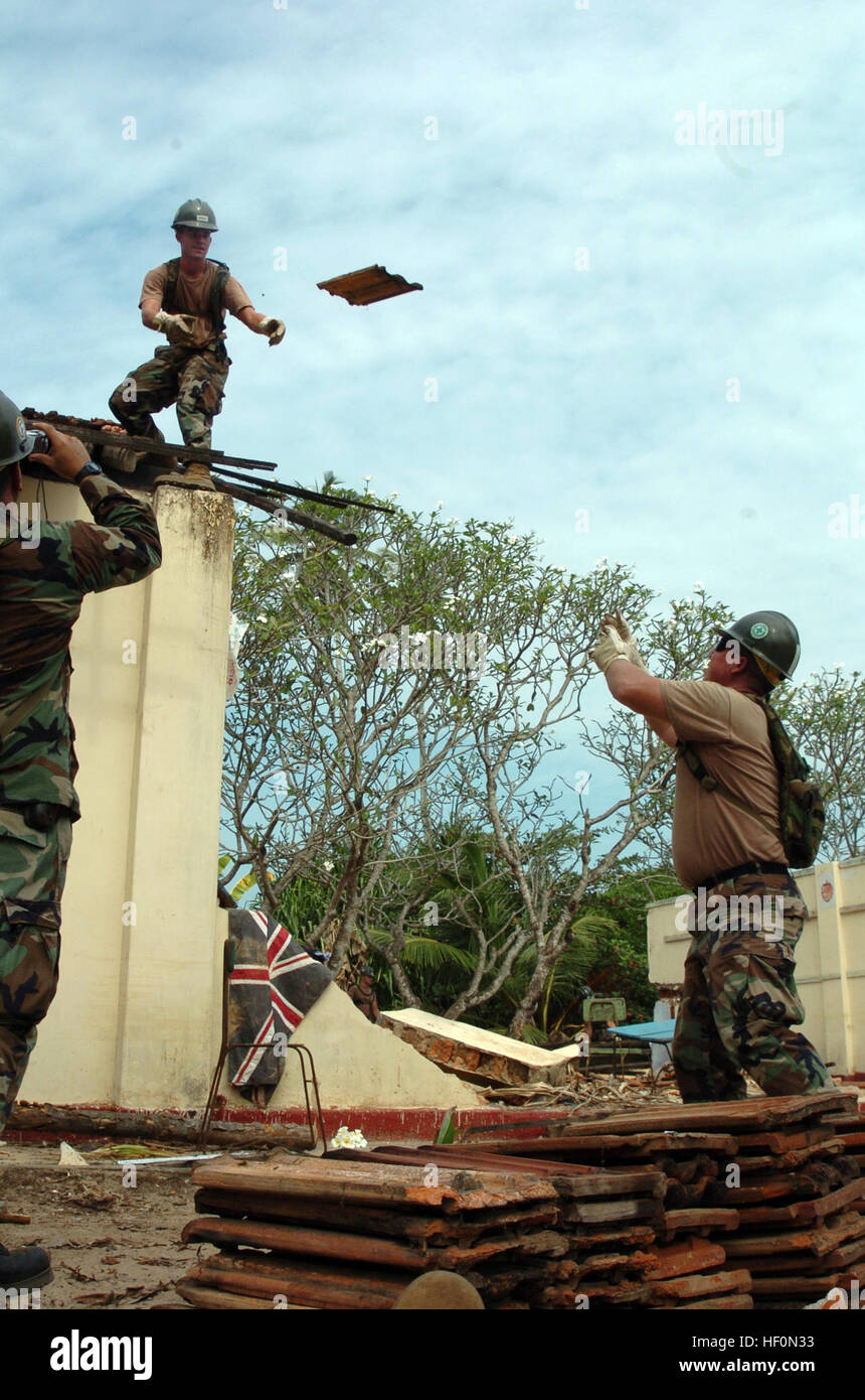 Members of Naval Mobile Construction Battalion Seven (NMCB-7) assisted ...