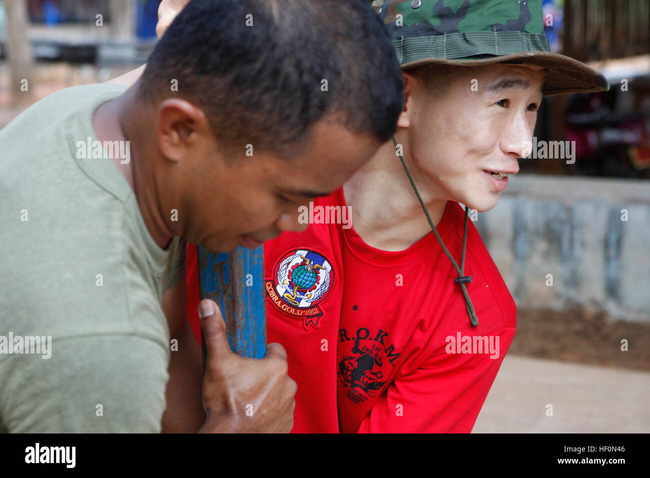 Republic of Korea Marine Cpl. Ja Jang, right and U.S. Navy Hospitalman ...