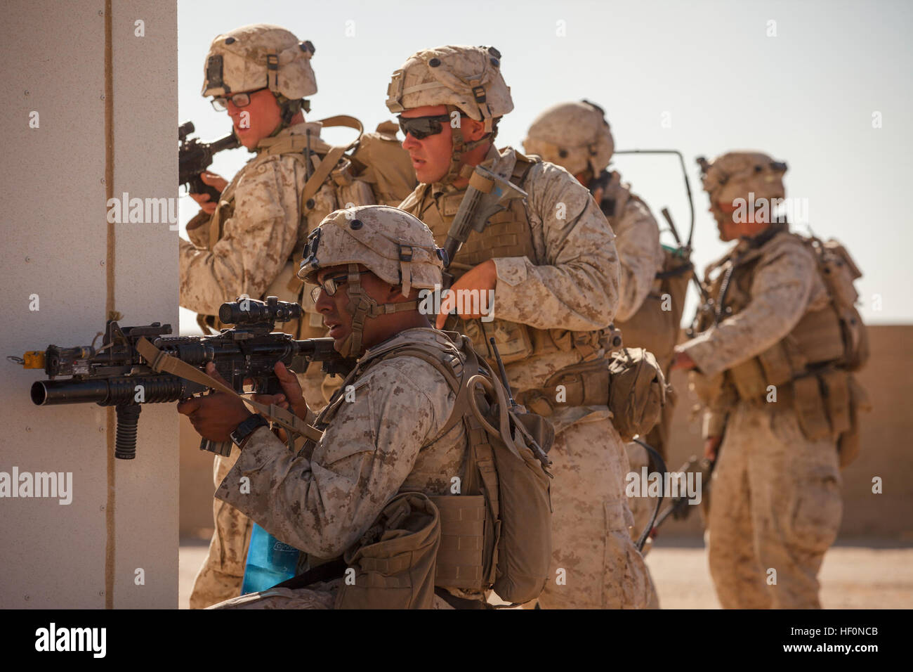 Marines with 3rd Battalion, 7th Marine Regiment, make their way around ...