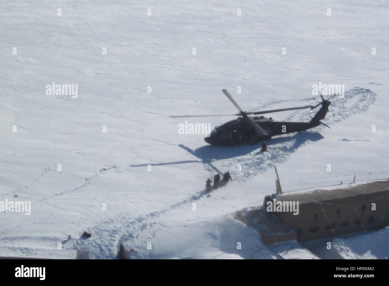 U.S. Special Operations Forces personnel board an ISAF helicopter ...