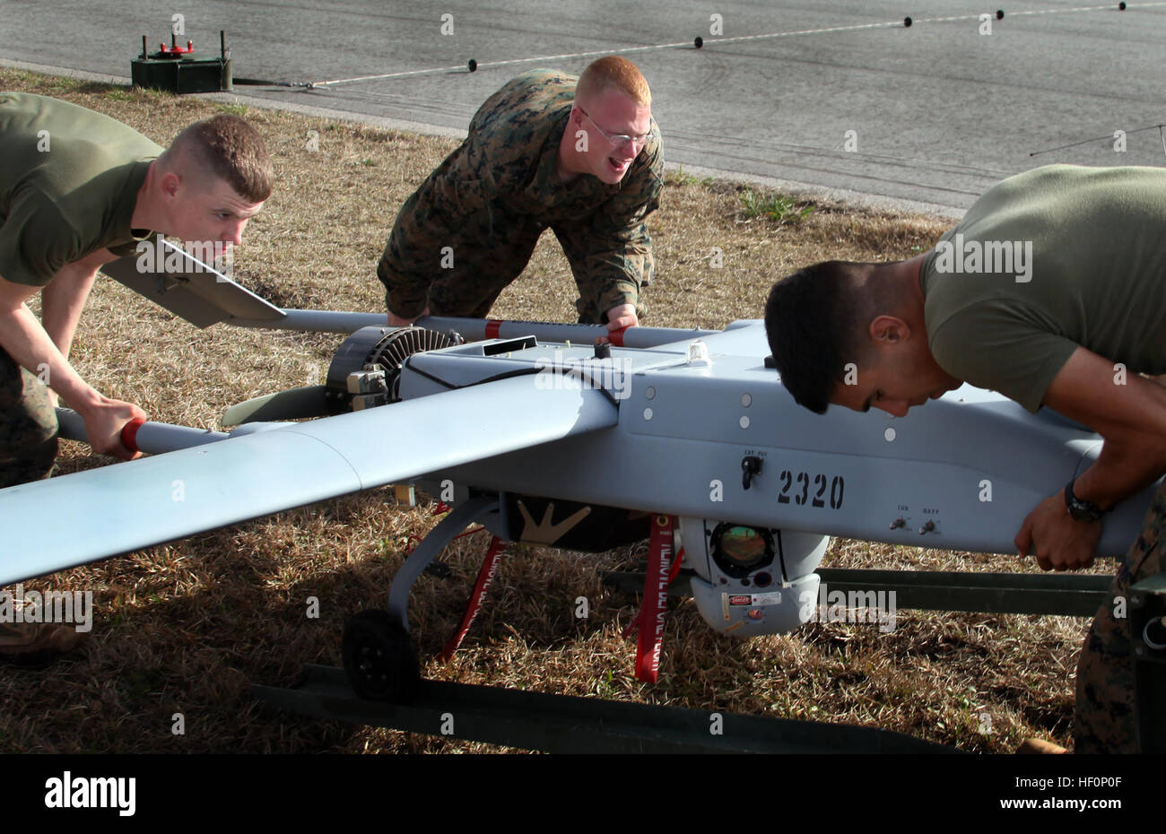 Lance Cpl. Brandon Dunlow, left, Lance Cpl. Eric Garcia, middle, and ...