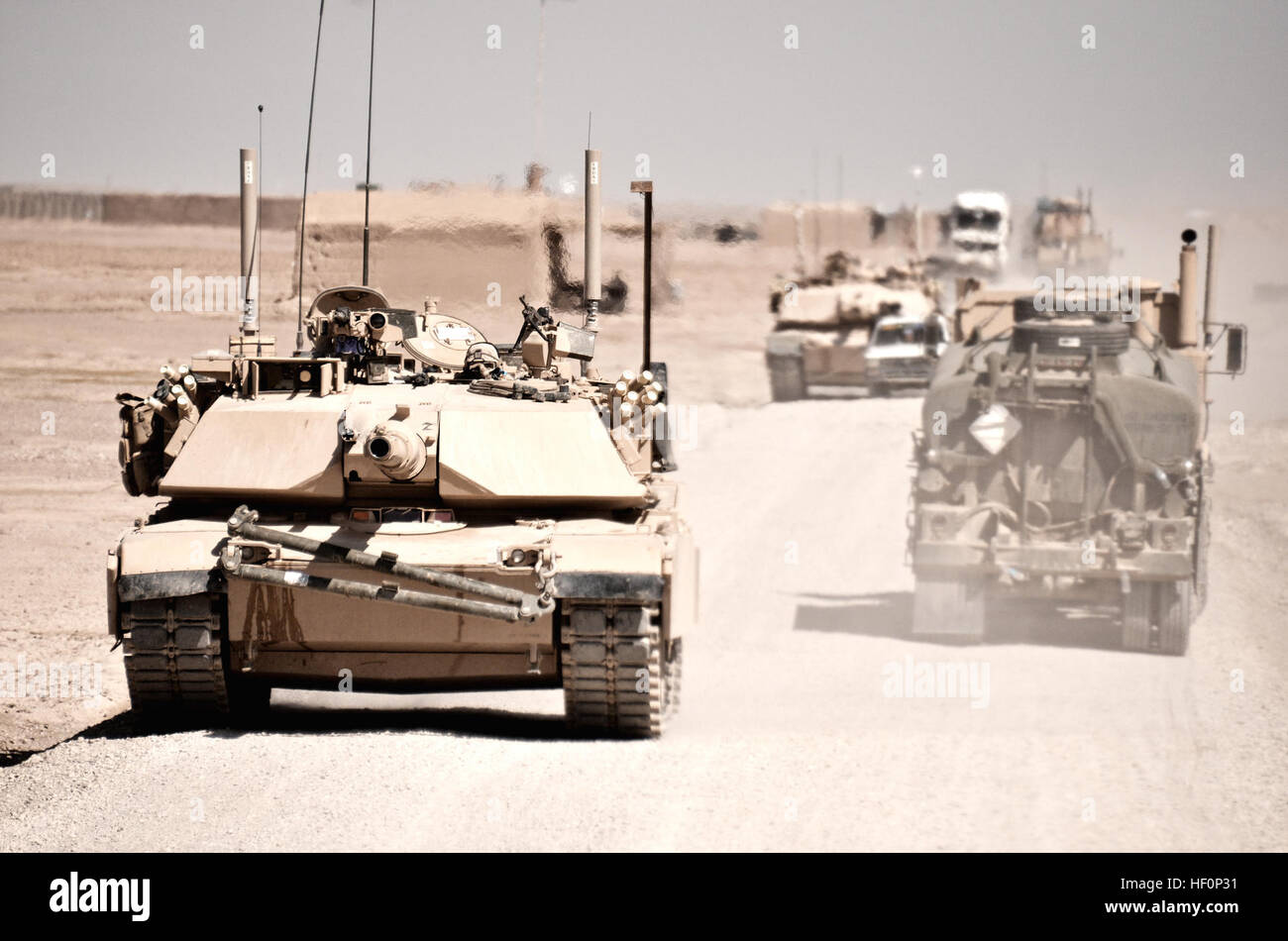 1st Tank Battalion tanks pass a Combat Logistics Battalion 4 AMK31 ...