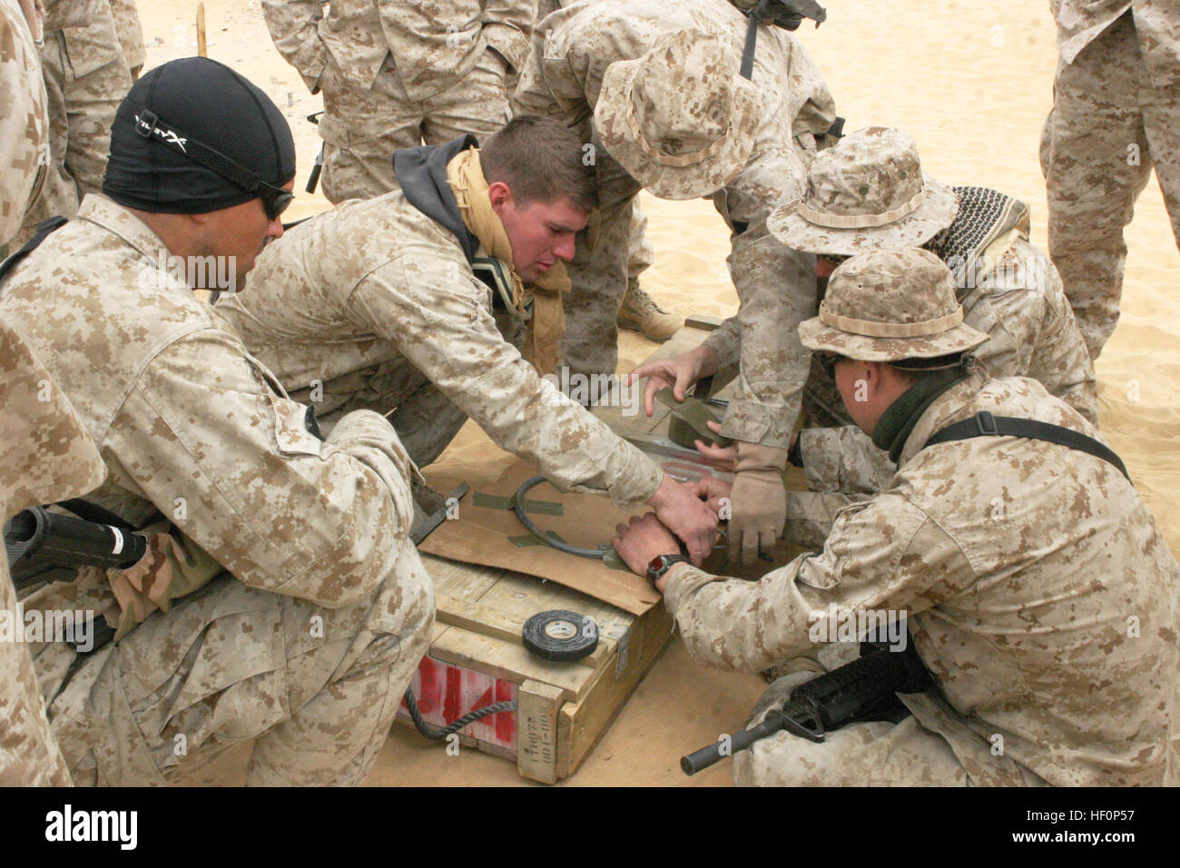 UDAIRI RANGE, Kuwait (Feb. 18, 2005) -- Marines work together to make a ...